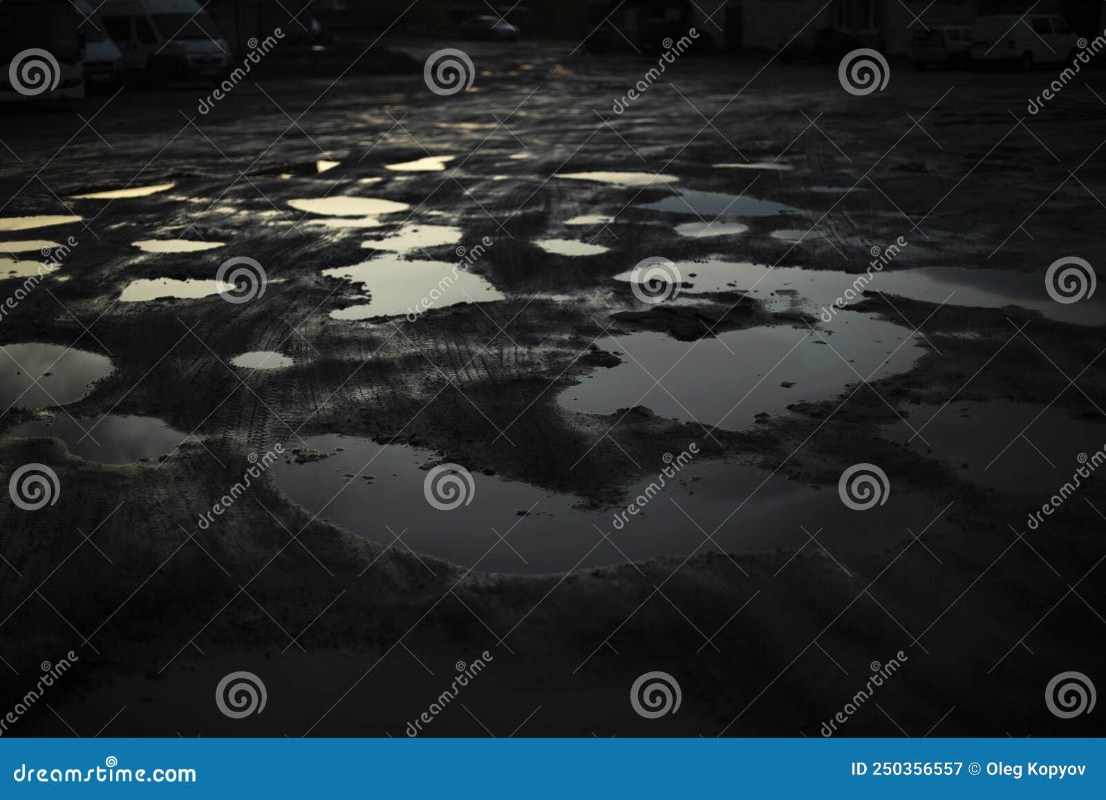 Large Puddle in Dark. Reflection of Light in Puddle Stock Image - Image ...