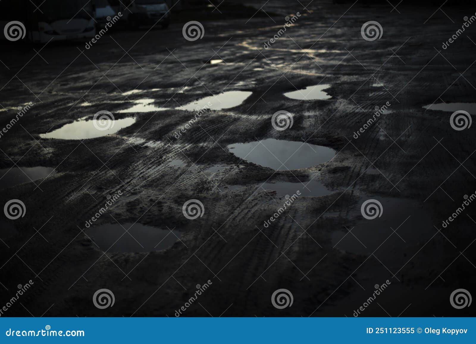 Large Puddle in Dark. Reflection of Light in Puddle Stock Image - Image ...