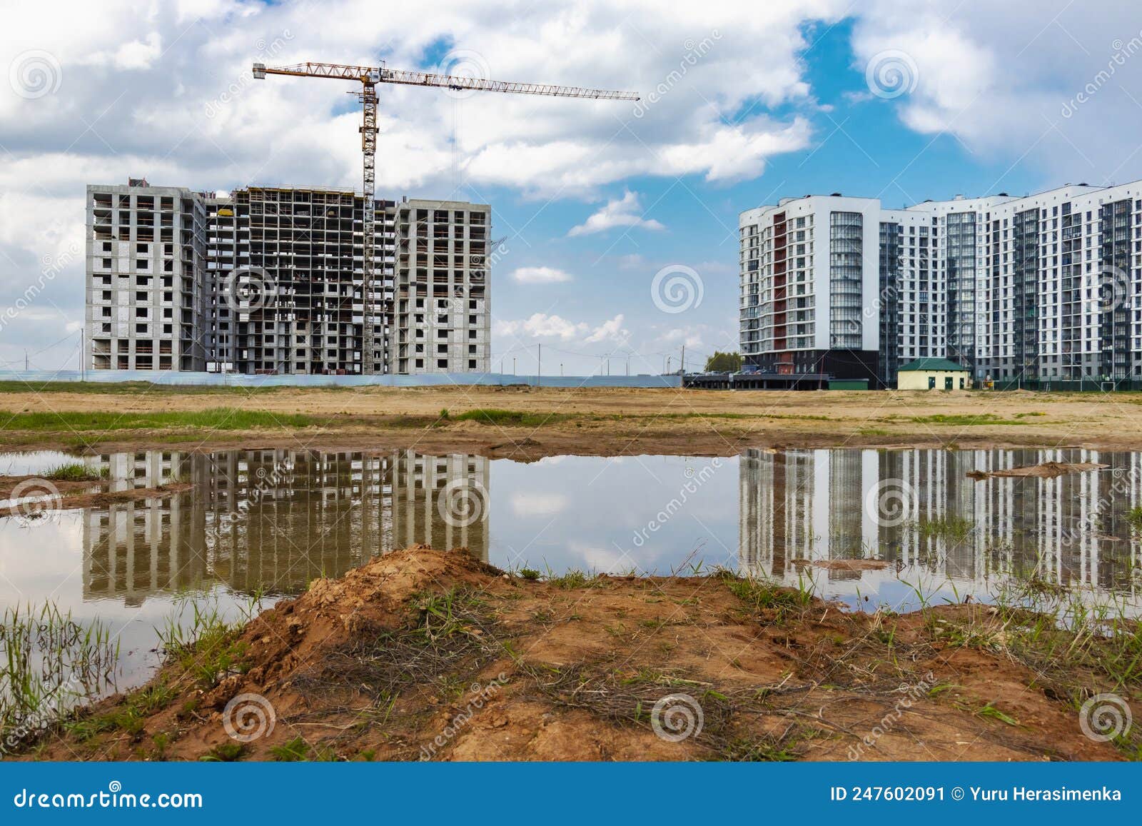A Large Puddle after Rain at the Construction Site of a Large ...