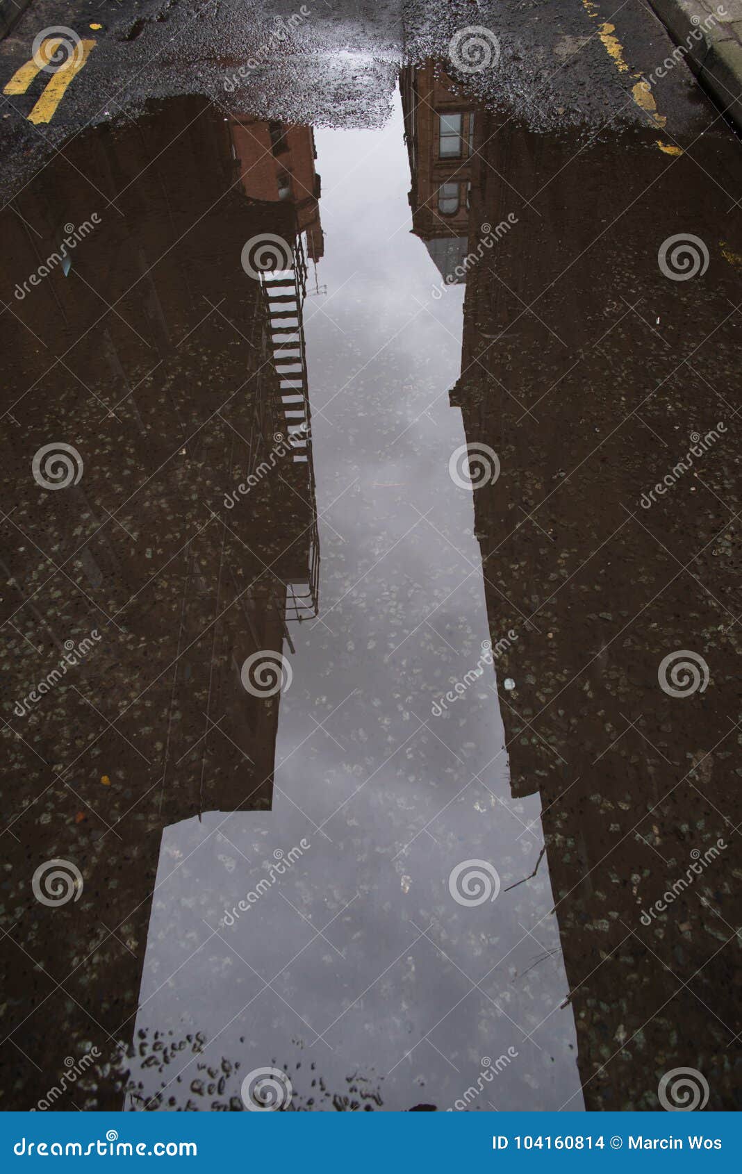 A Large Puddle on the Road with the Reflection Manchester Stock Photo ...