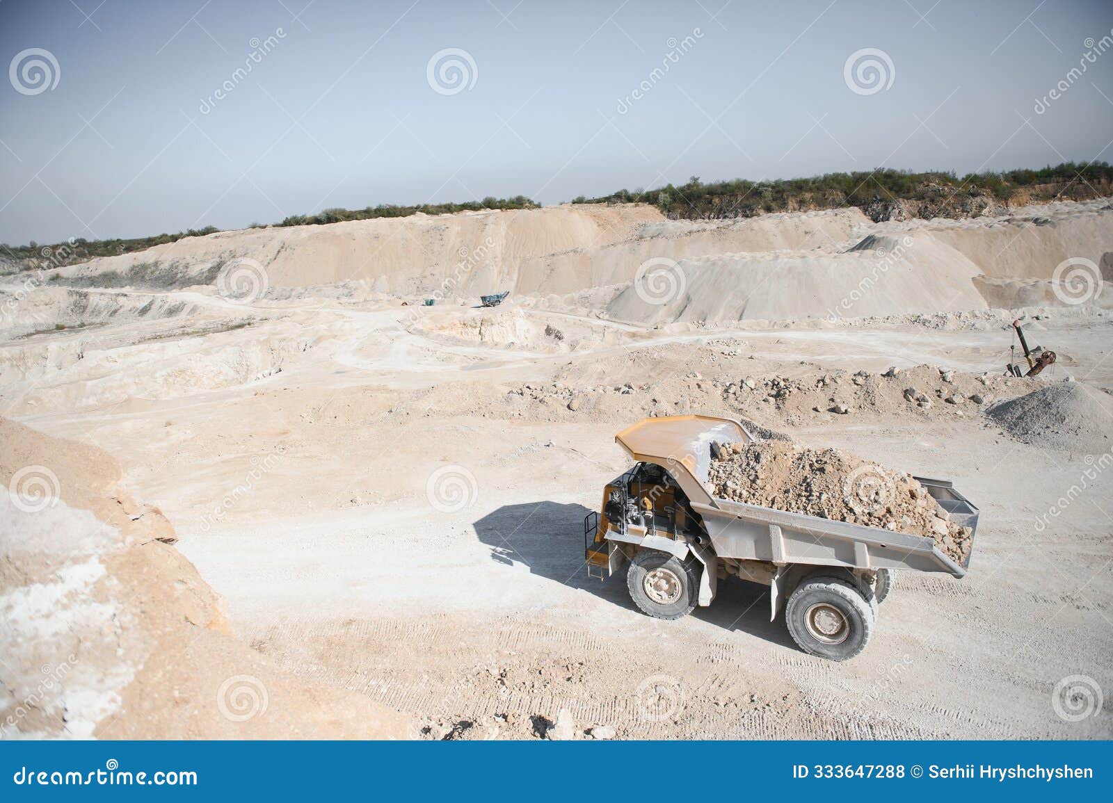 Large Quarry Dump Truck. Big Yellow Mining Truck at Work Site. Quarry ...