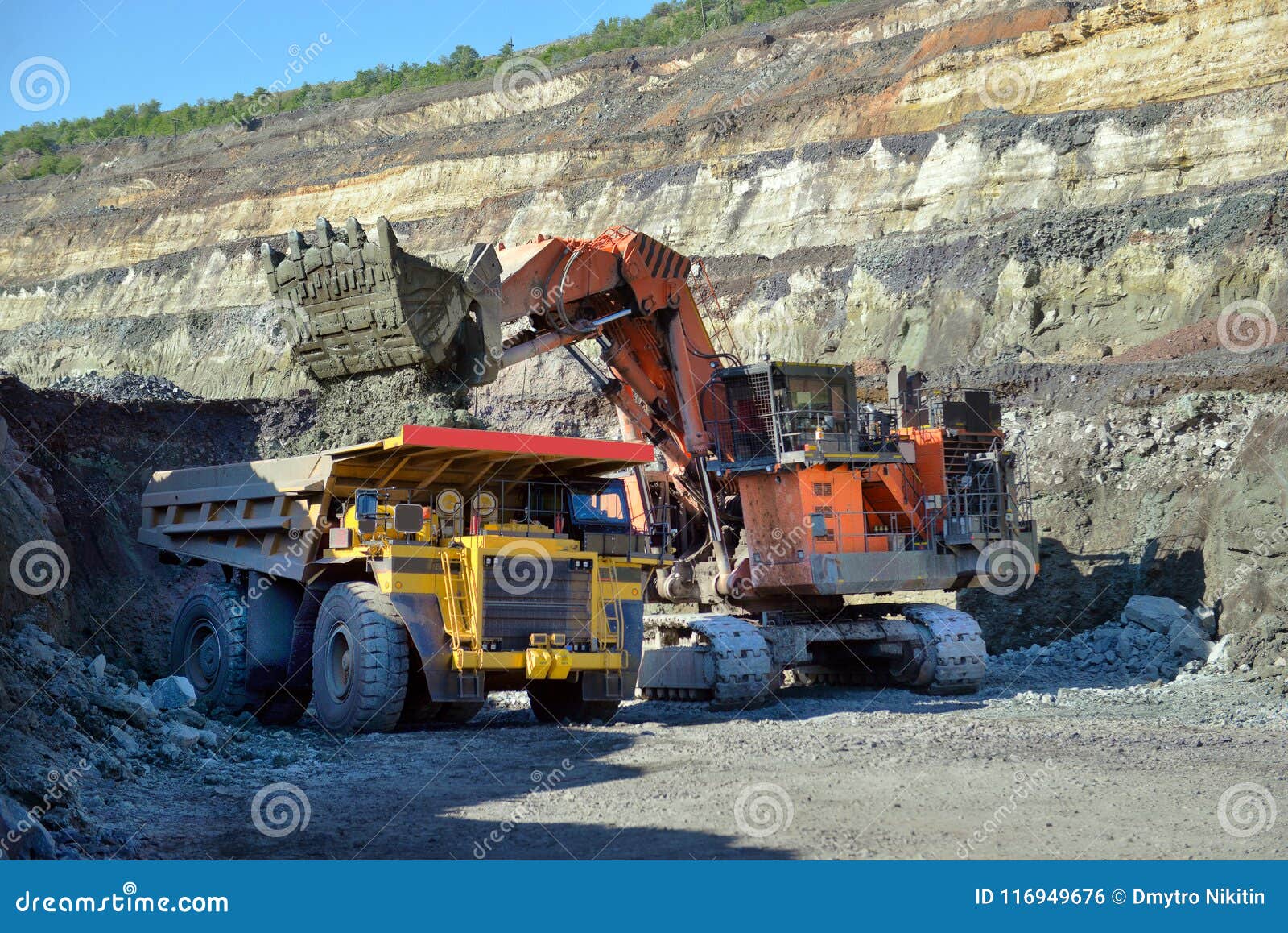 Large Quarry Dump Truck. Loading the Rock in the Dumper Stock Photo ...