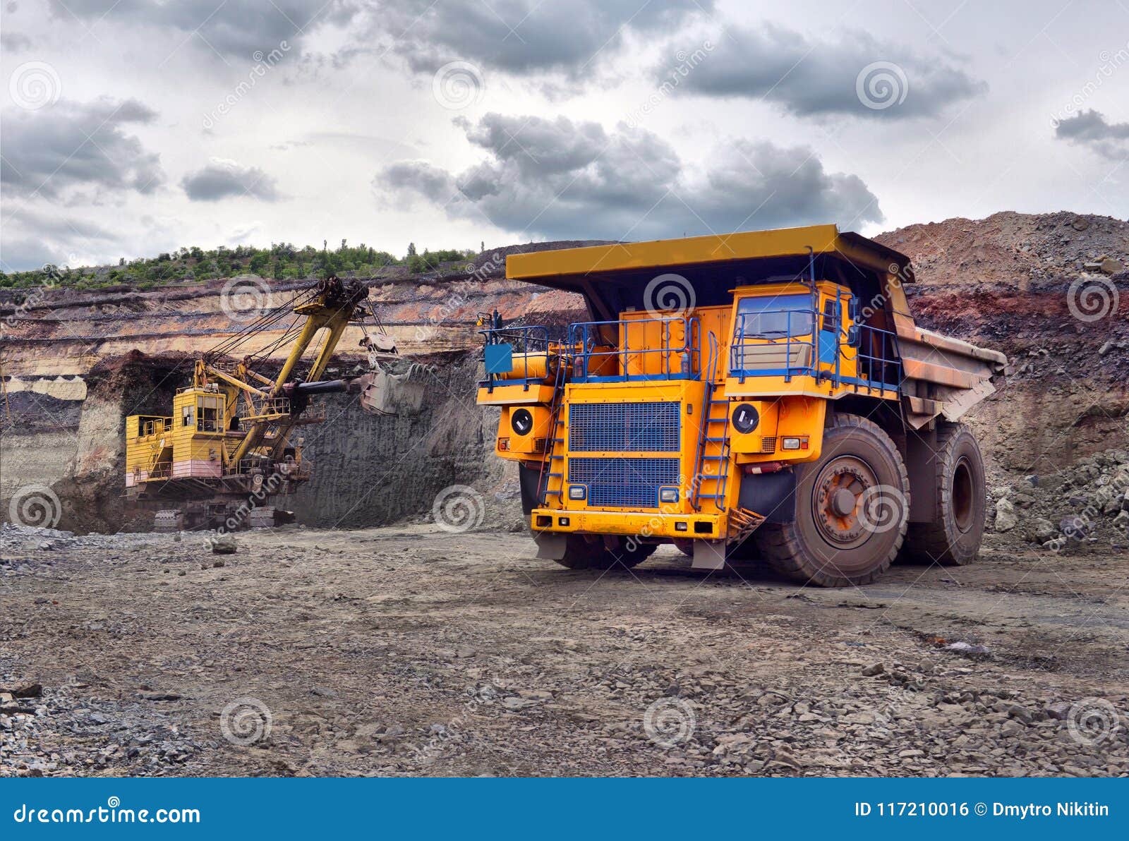 Large Quarry Dump Truck. Loading the Rock in the Dumper Stock Photo ...