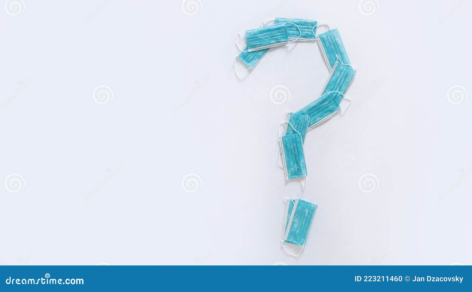 A Large Question Mark Made Up of Disposable Face Masks on a White ...