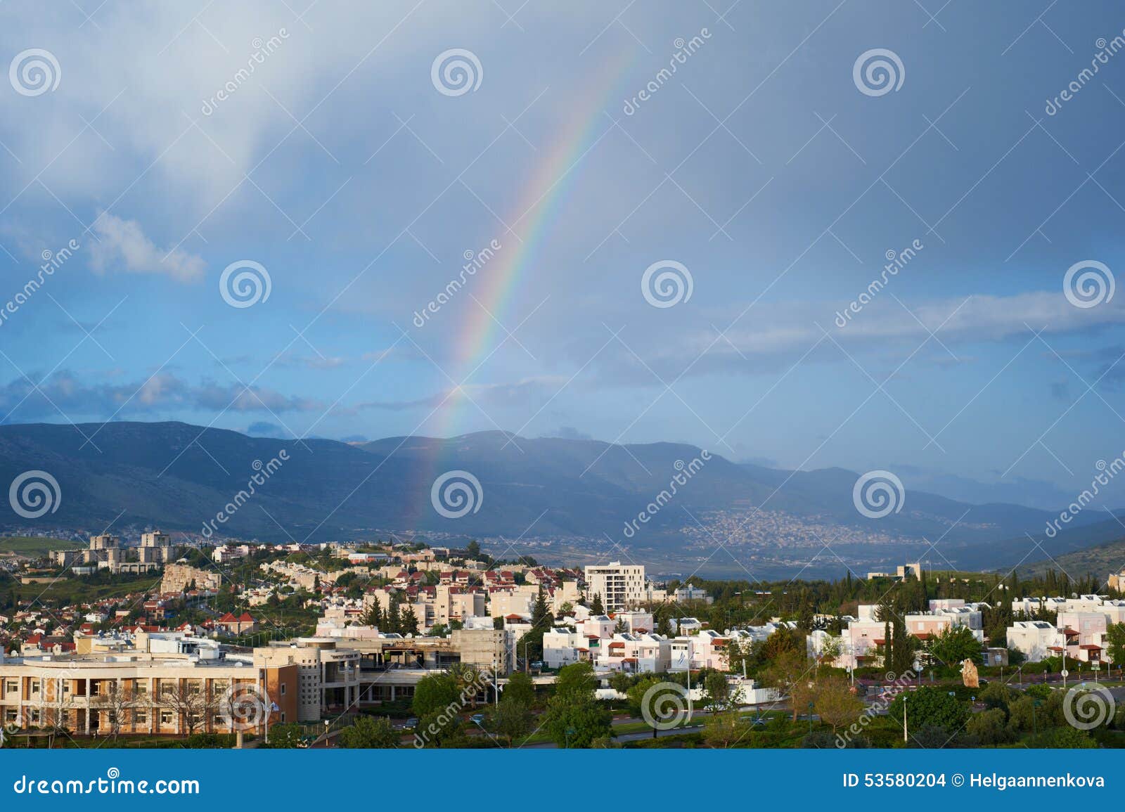 Large rainbow over Karmiel stock photo. Image of plants - 53580204