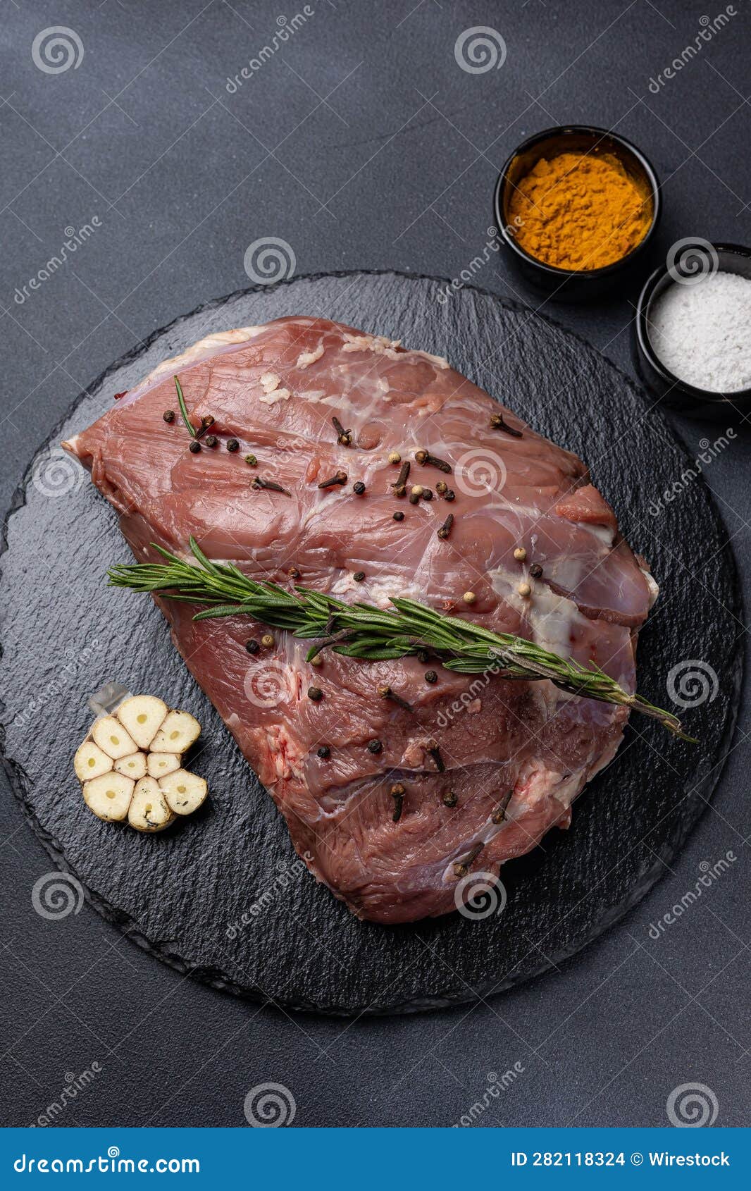 Large Raw Piece of Meat on a Black Background Stock Photo - Image of ...