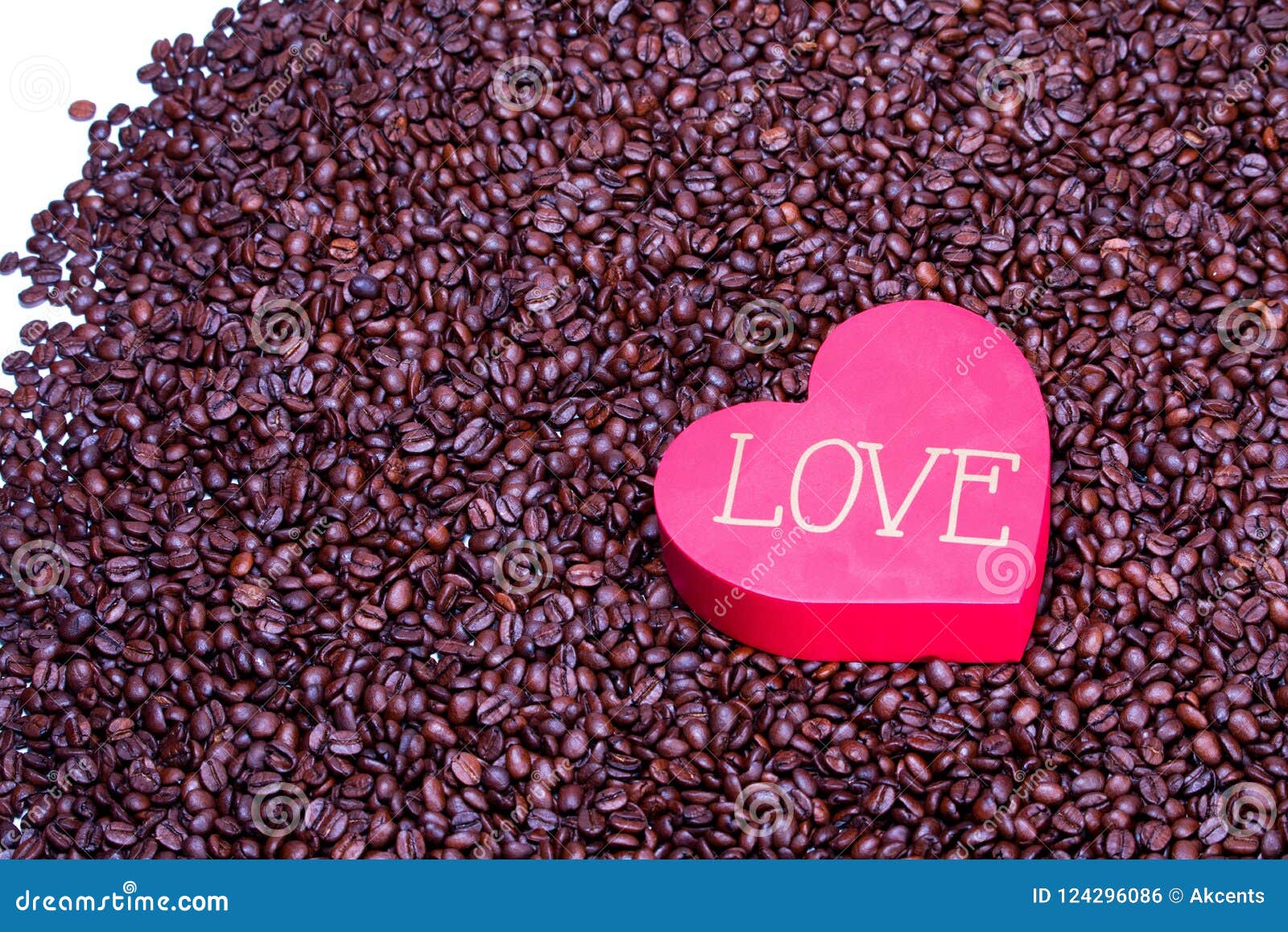 Large Red Heart Spelling Love Sitting On Top Of Coffee Beans Stock