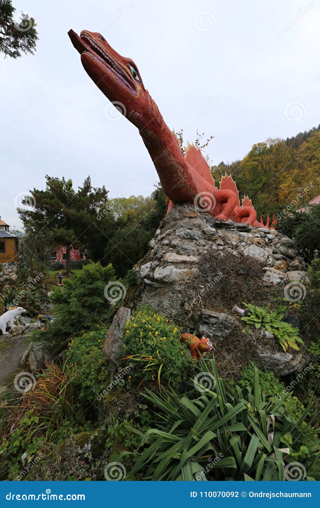 Large Red Prehistoric Lizard Head on the Rock Stock Photo - Image of ...