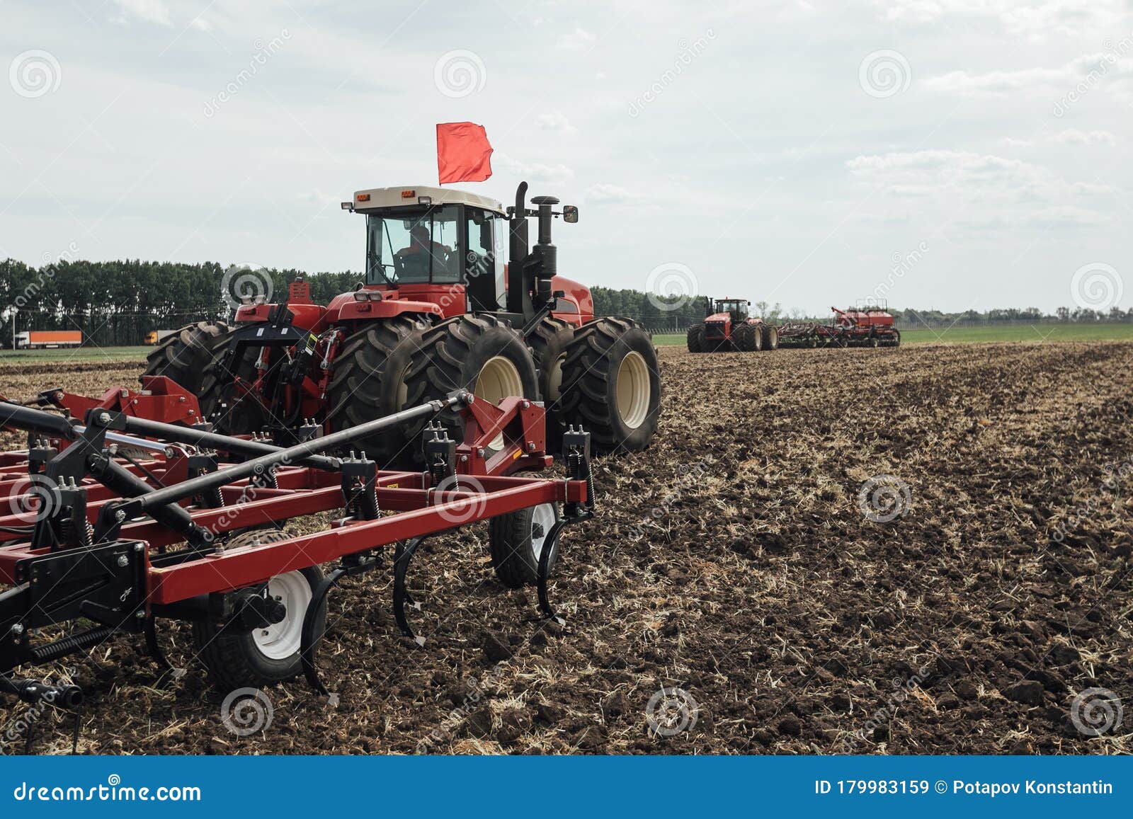 Large Red Tractor Trailer for Tillage during Sowing in Spring in Russia ...