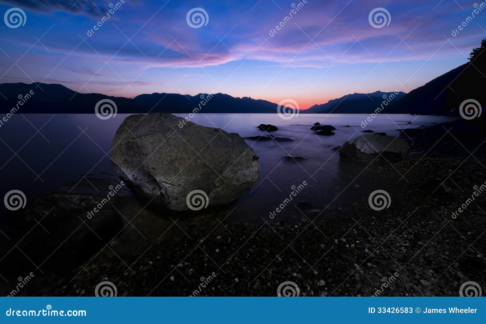 Large Rock Along Lake Shore at Night Stock Image - Image of evening ...