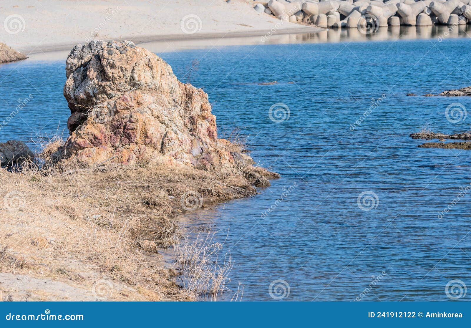Large Rock Formation on Ocean Coast Stock Photo - Image of rippled ...