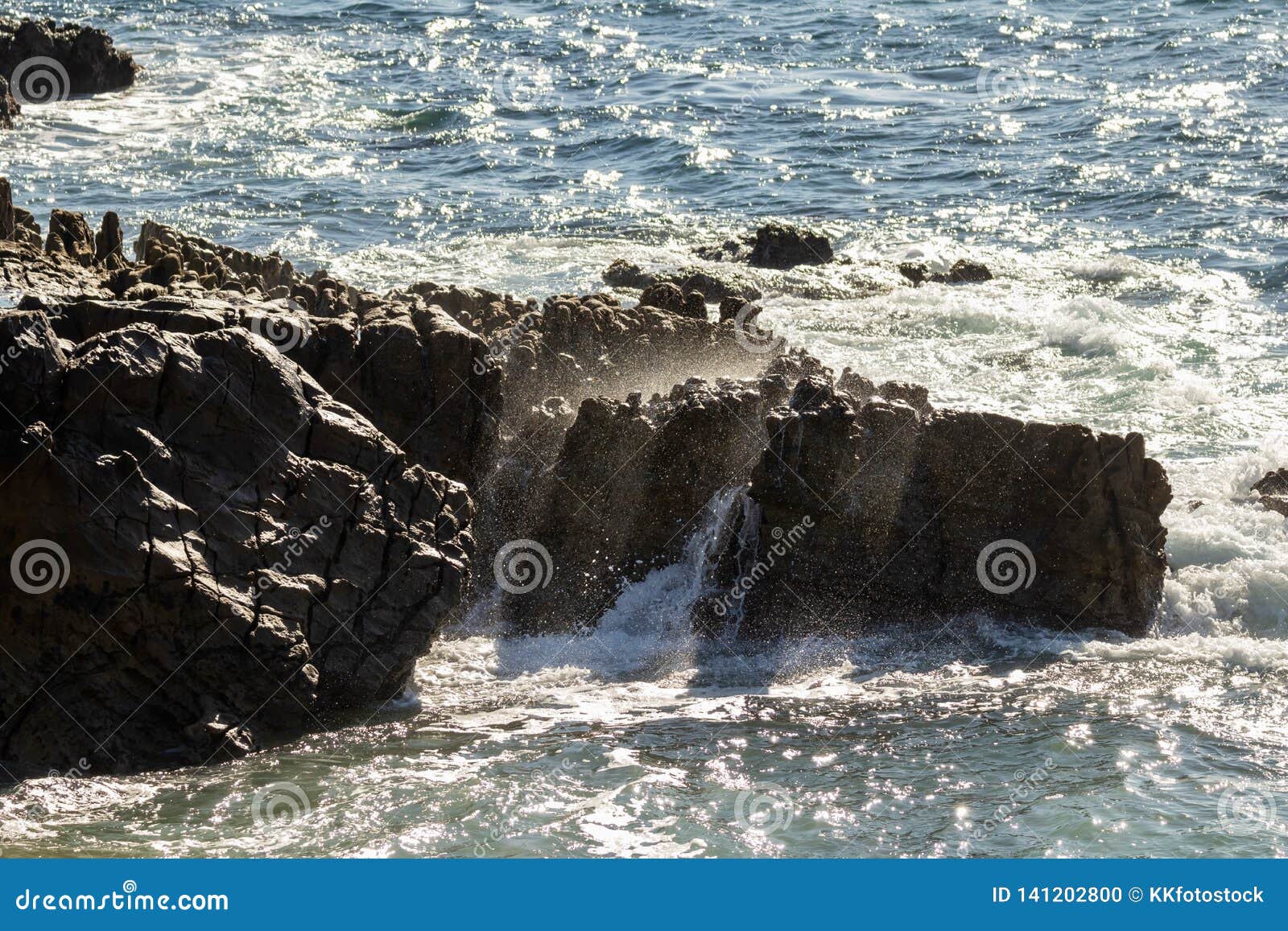Large rocks in the ocean stock photo. Image of large - 141202800