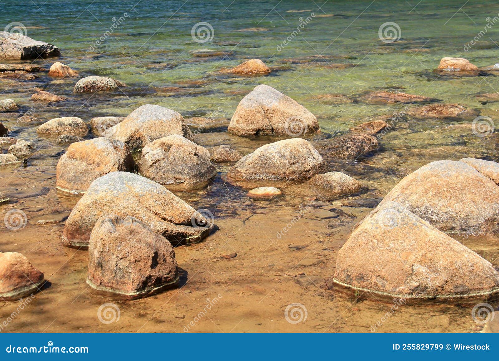 Large Rocks in Shallow Sea Water by the Shore Stock Image - Image of ...