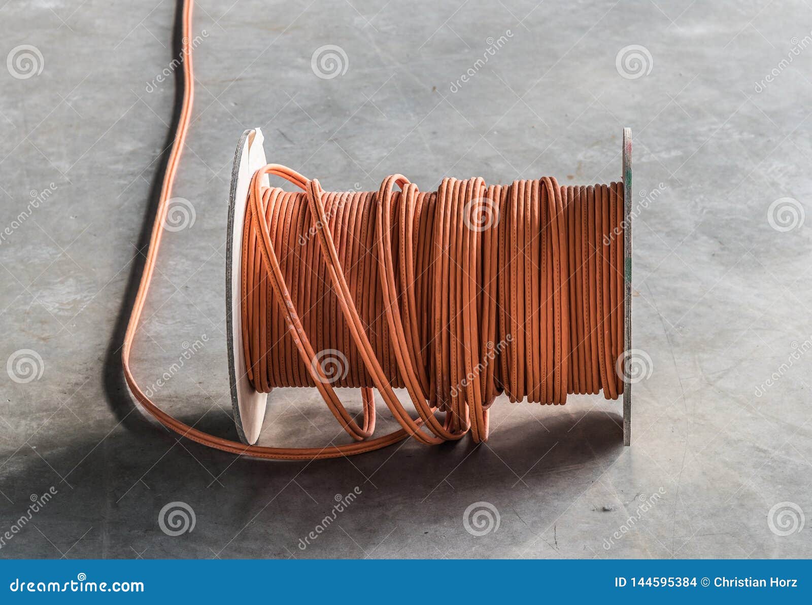 Large Roll of Communications Cable on Concrete Floor Stock Photo ...