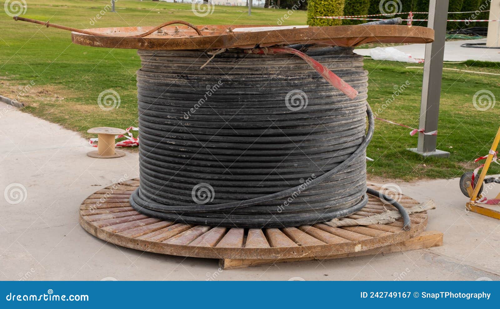 Roll Of Flexible Tube And A Fire Extinguisher Royalty-Free Stock Photo ...