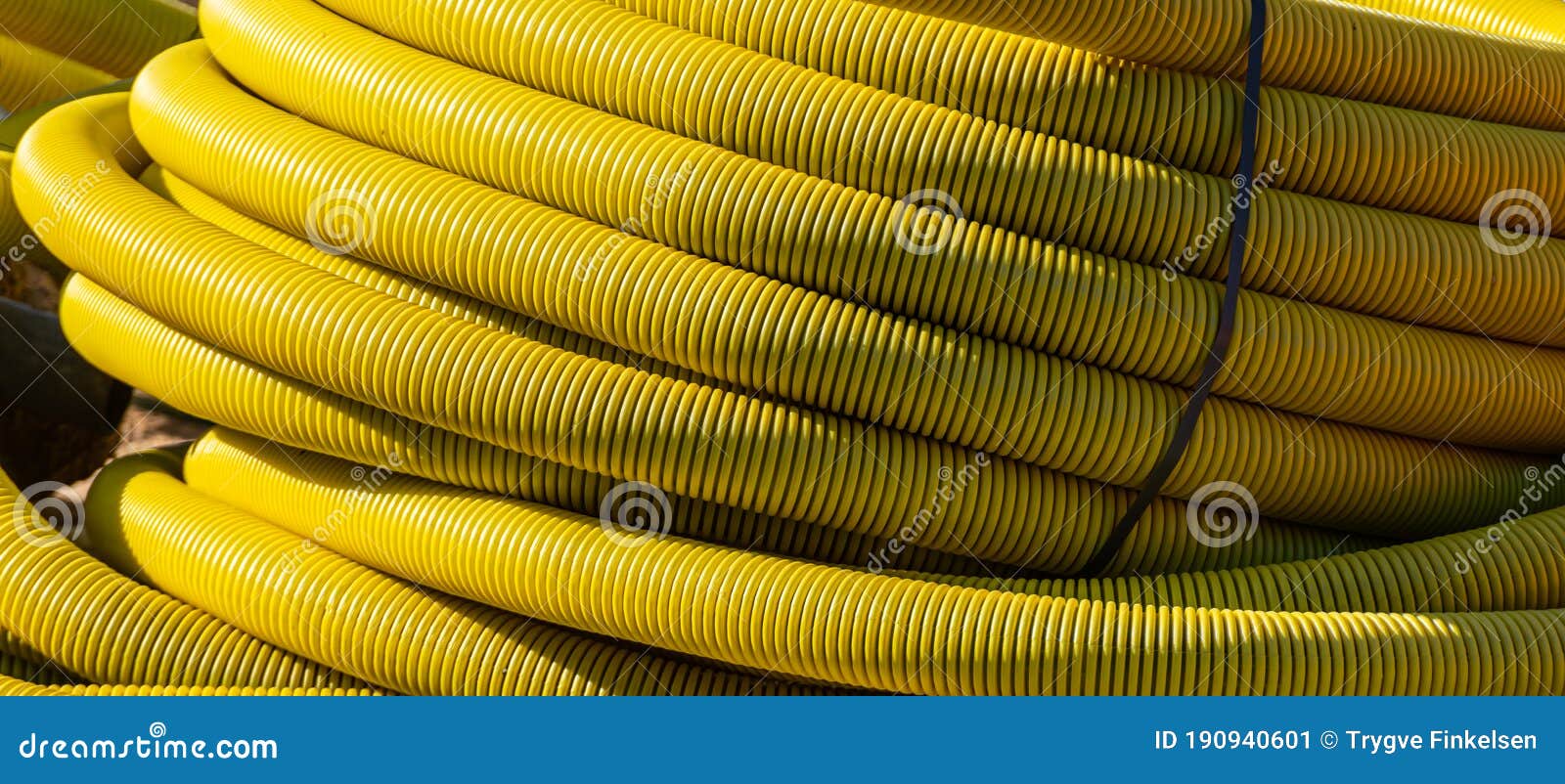 Large Roll of Yellow Flexible Pipe at a Building Site Stock Image ...