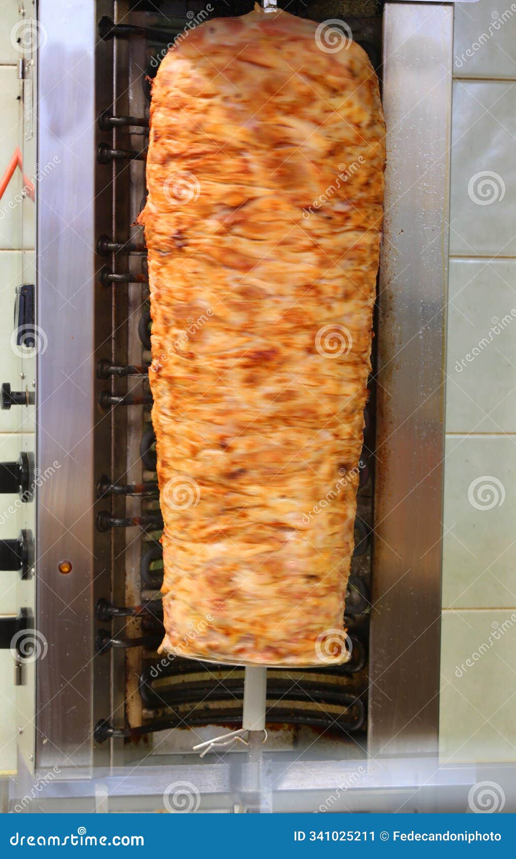 Large Rotating Kebab Spit with Cooked Meat in a Shop Stock Image ...