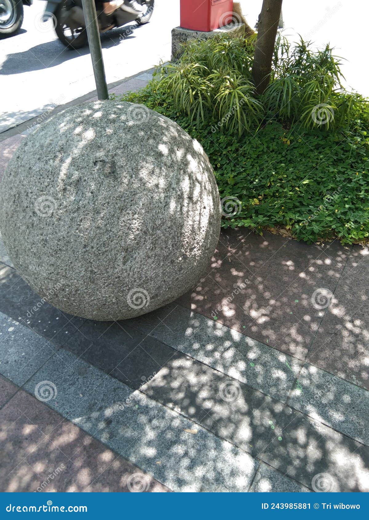 A Large Round Cast Stone on the Pavement Stock Image - Image of stone ...