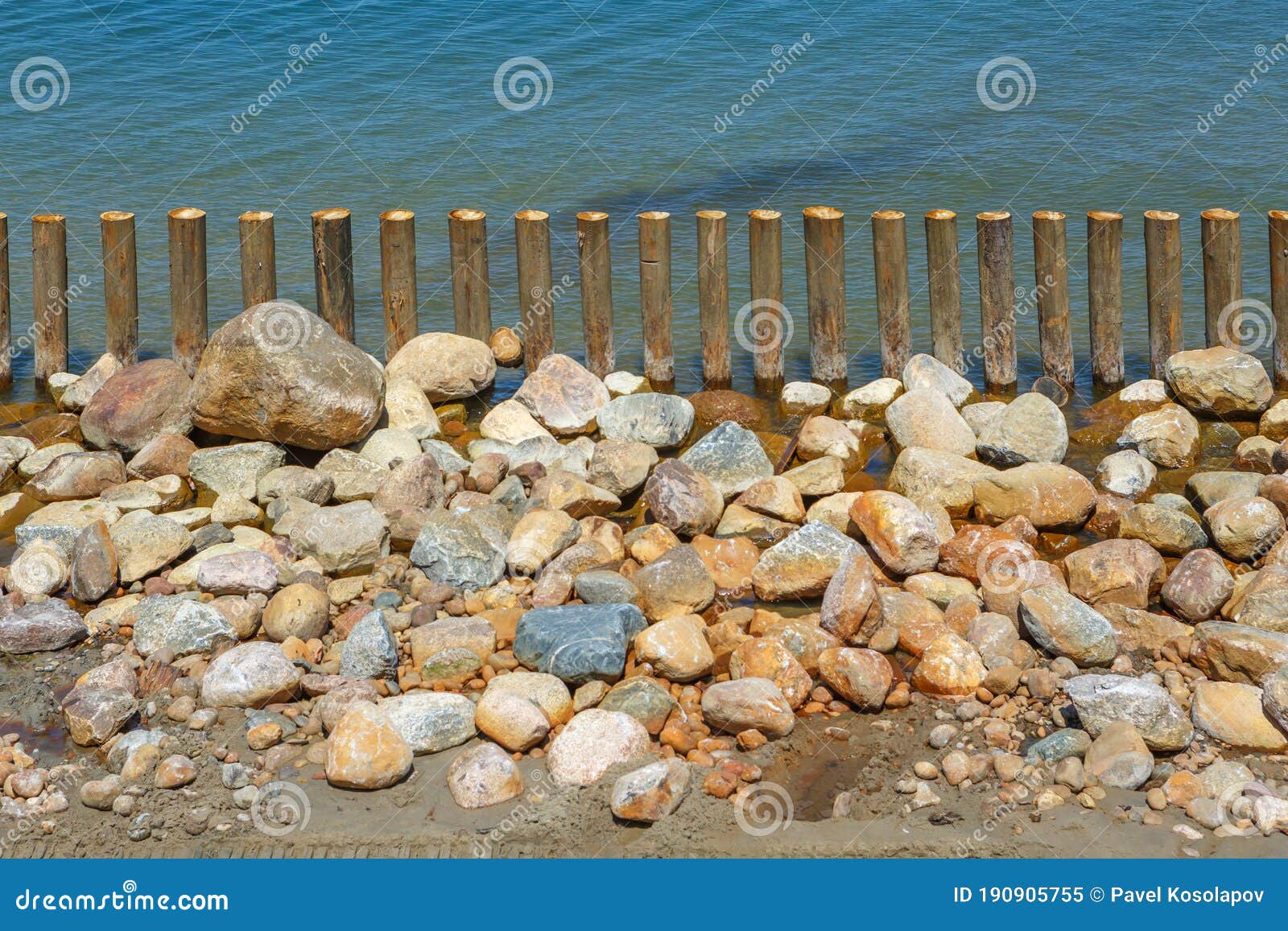 Large rubble on the beach stock image. Image of rock - 190905755