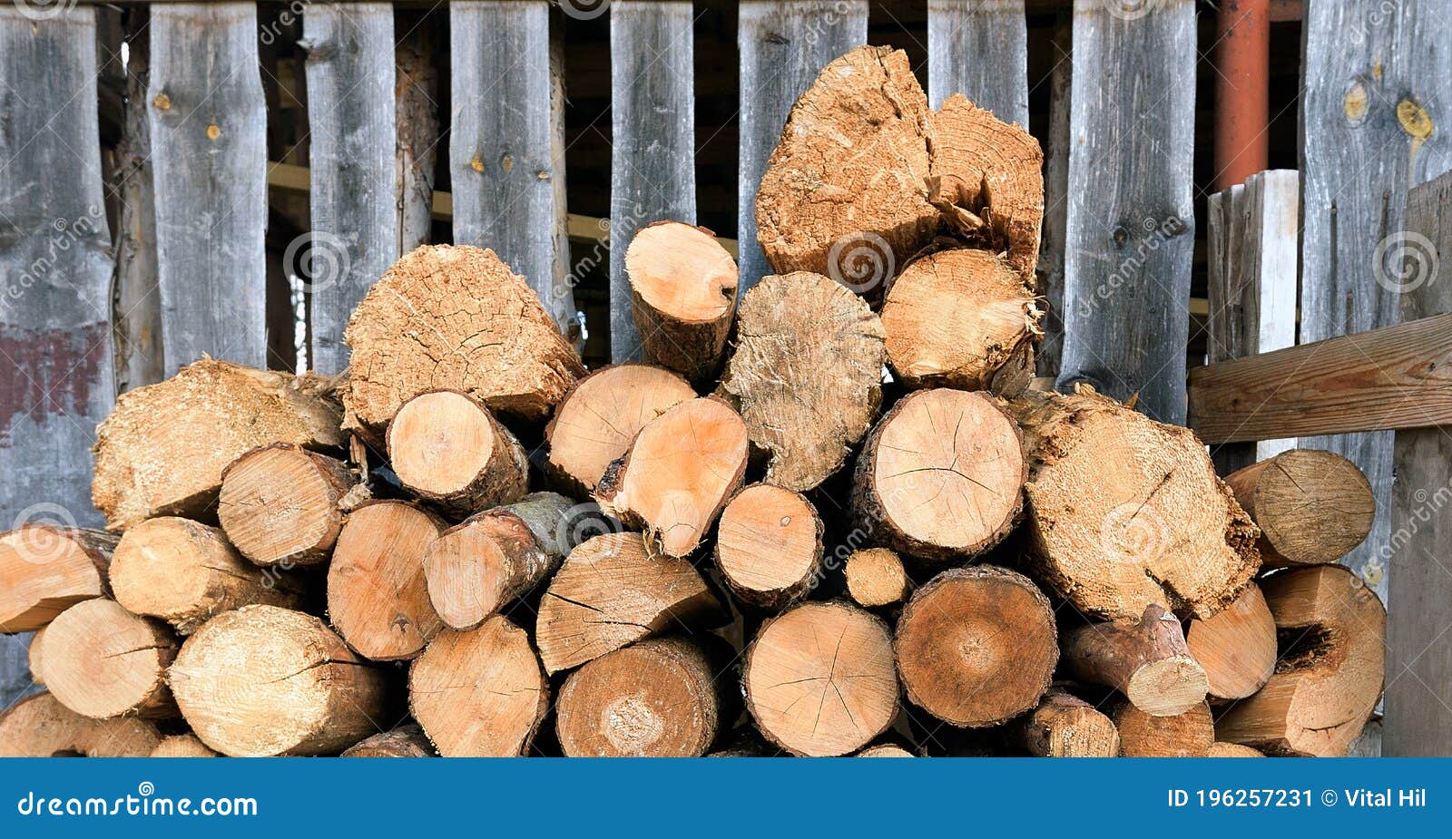 Large Rural Stack of Firewood. Old Firewood. Background Stock Image ...