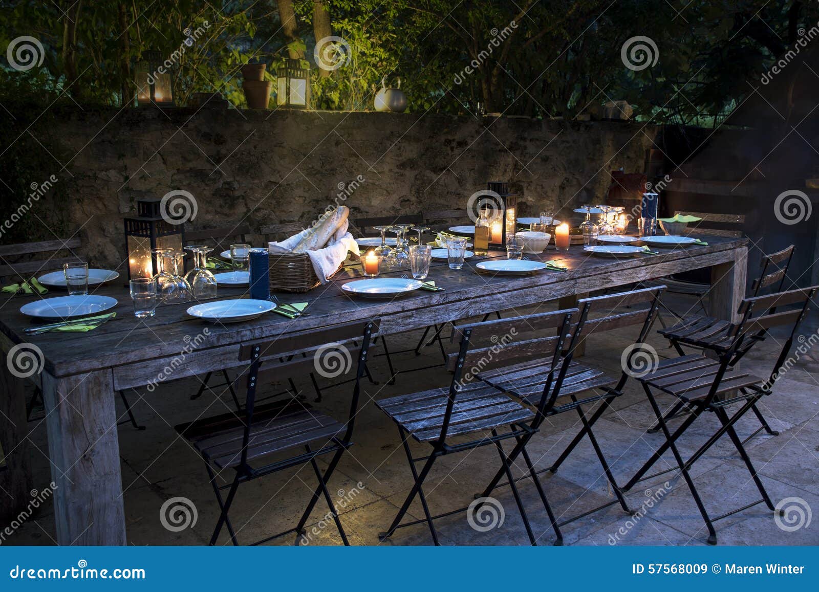 Large Rustic Table Prepared for a Outside Dinner at Night Stock Image ...