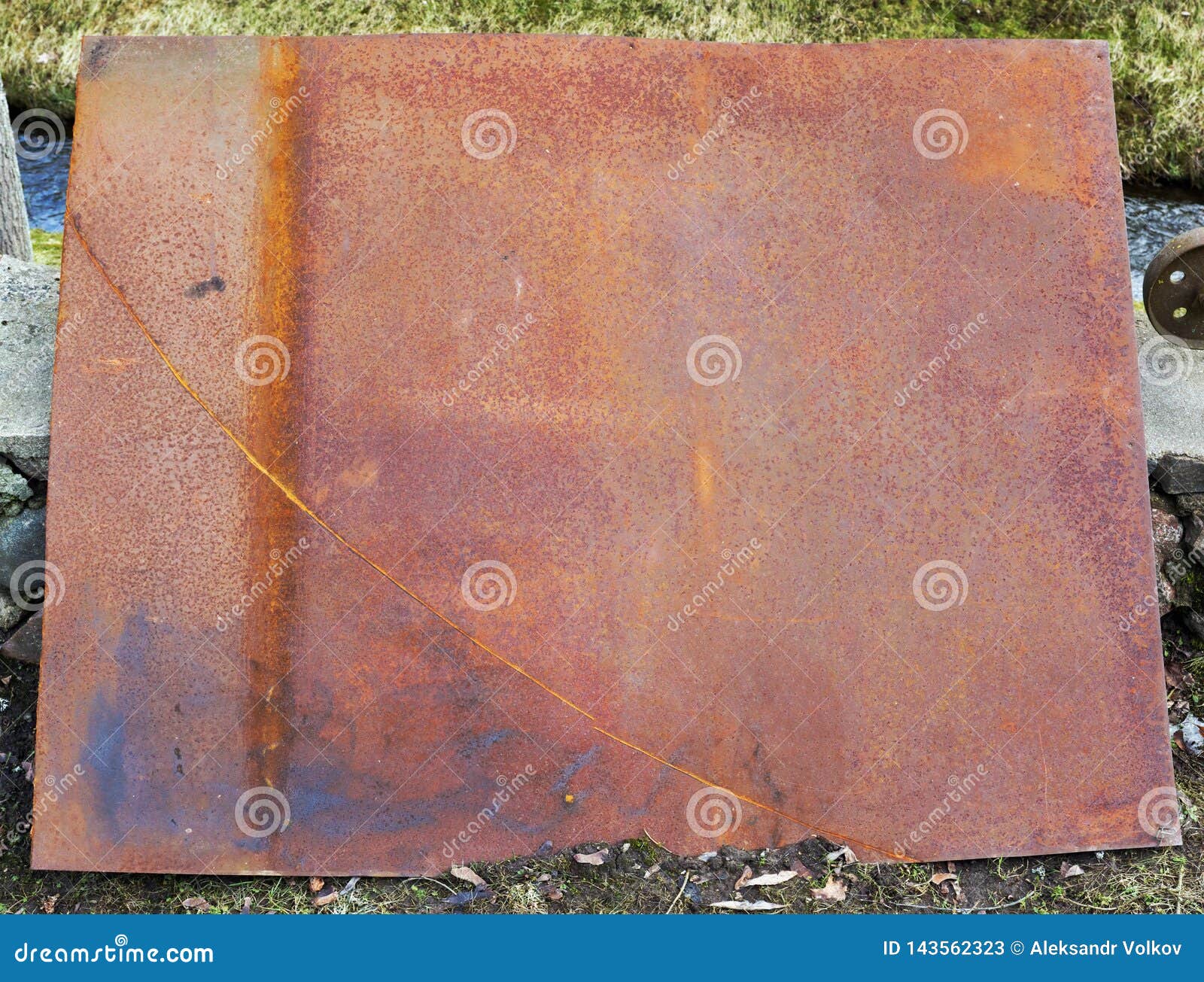 Large Rusty Iron Sheet on a Rustic Courtyard Stock Image - Image of ...