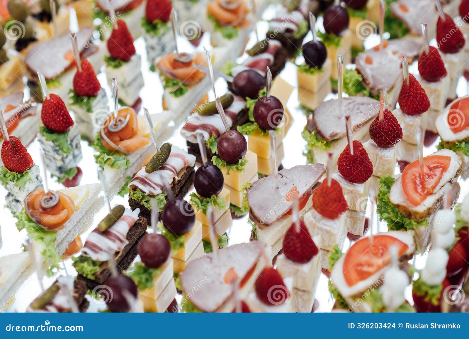 A Large Selection of Various Snacks for Guests on a Mirror Surface ...