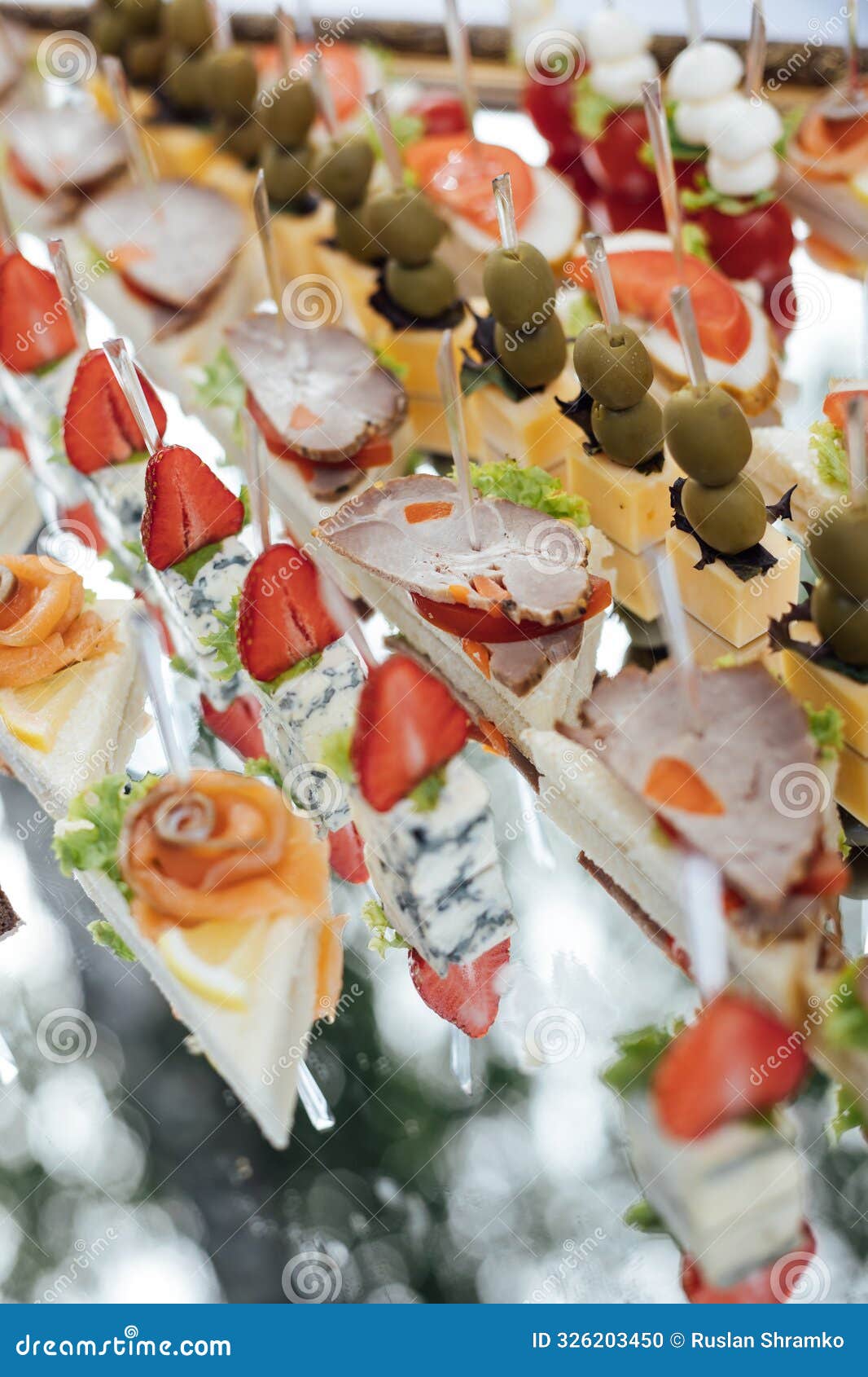 A Large Selection of Various Snacks for Guests on a Mirror Surface ...