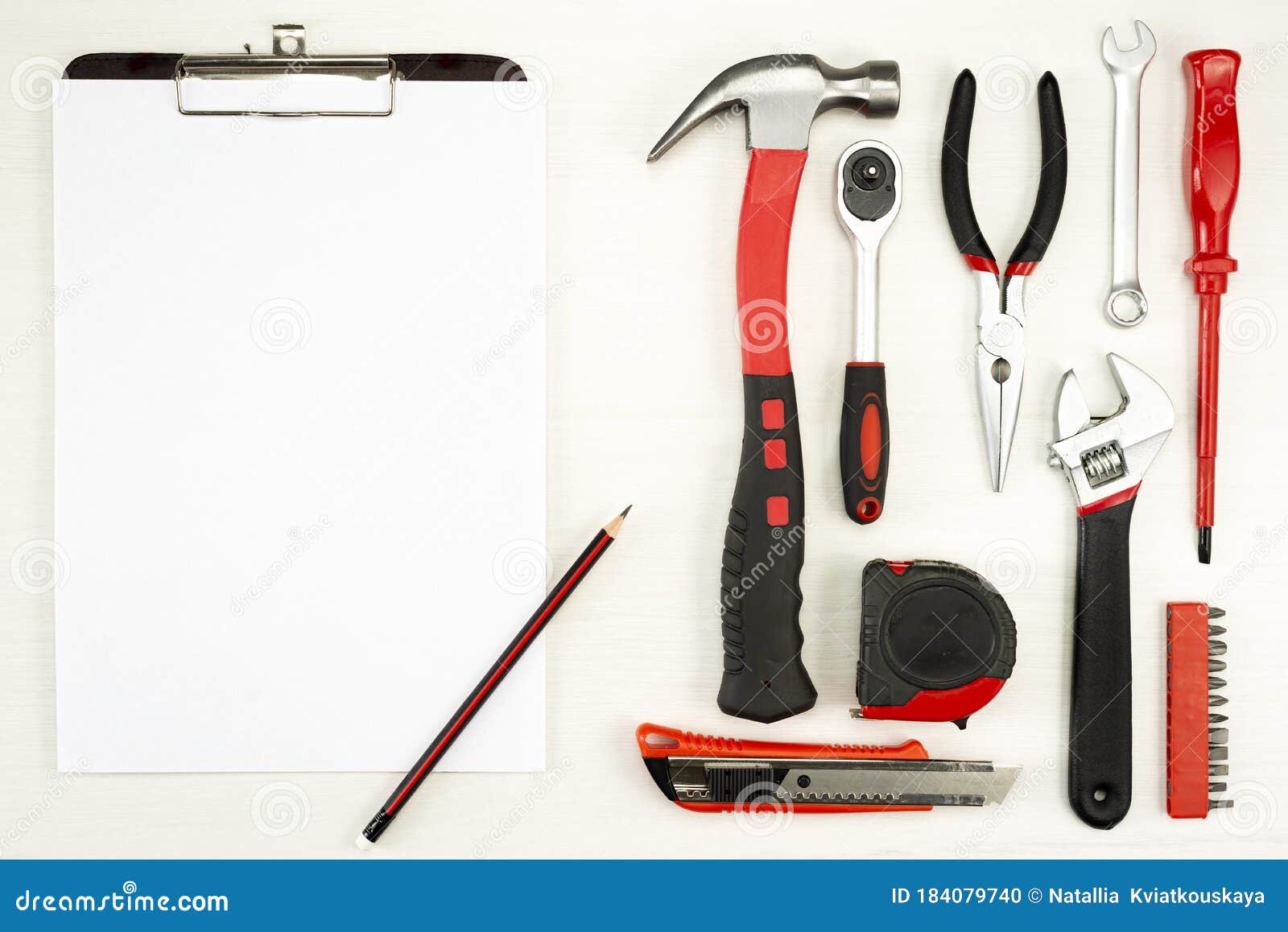Large Set of Construction Tools with a Sheet of White Paper with a ...