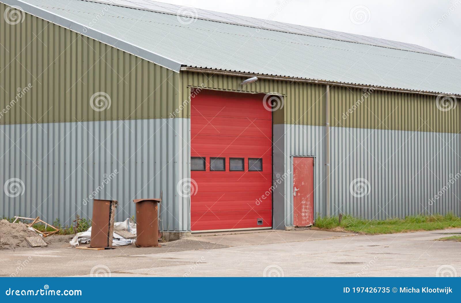 Large shed with red door stock image. Image of hangar - 197426735