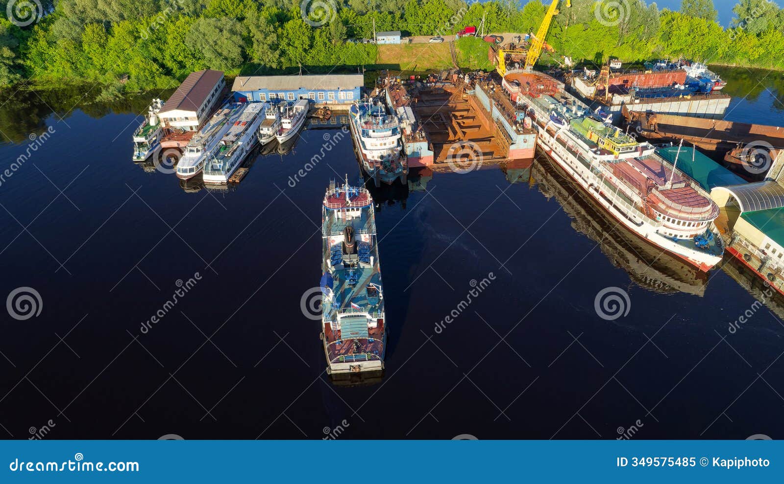 Large Ship is Docked at a Pier with Several Other Ships in the ...