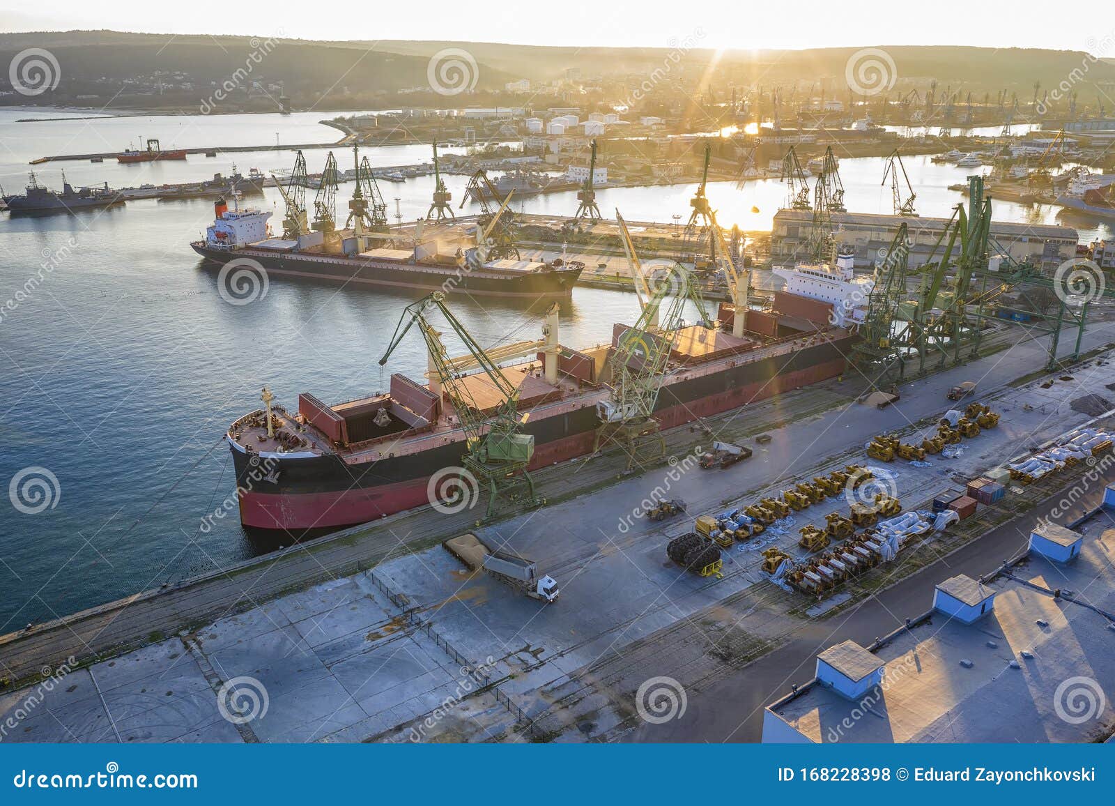 A Large Ship Loading Grain for Export in the Harbor. Water Transport ...