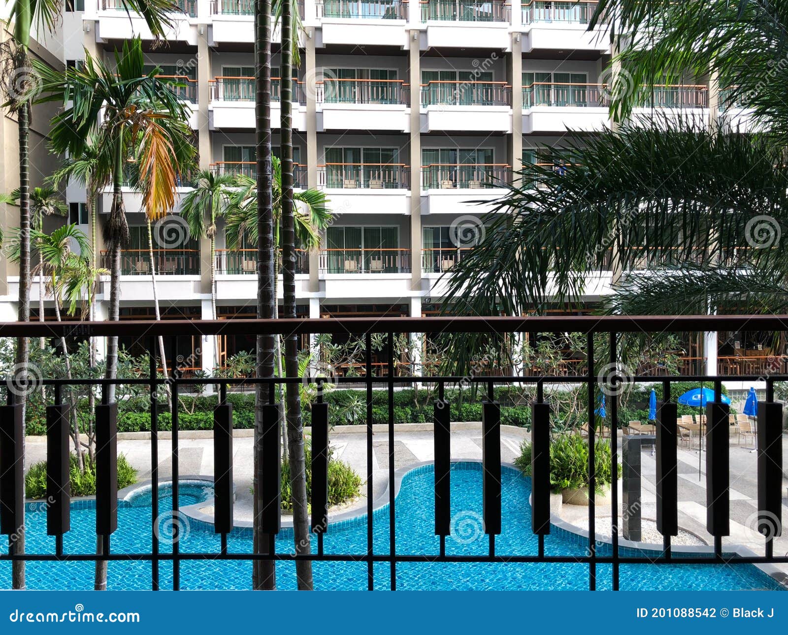 A Large Size Swimming Pool among High Rise Buildings Stock Photo ...