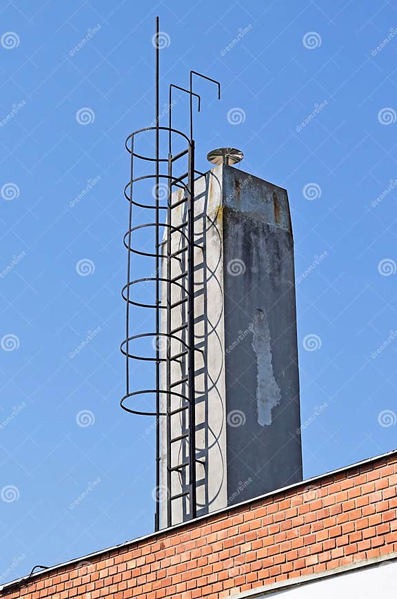 Large Smoke Stack with Ladder Stock Photo - Image of ladder ...