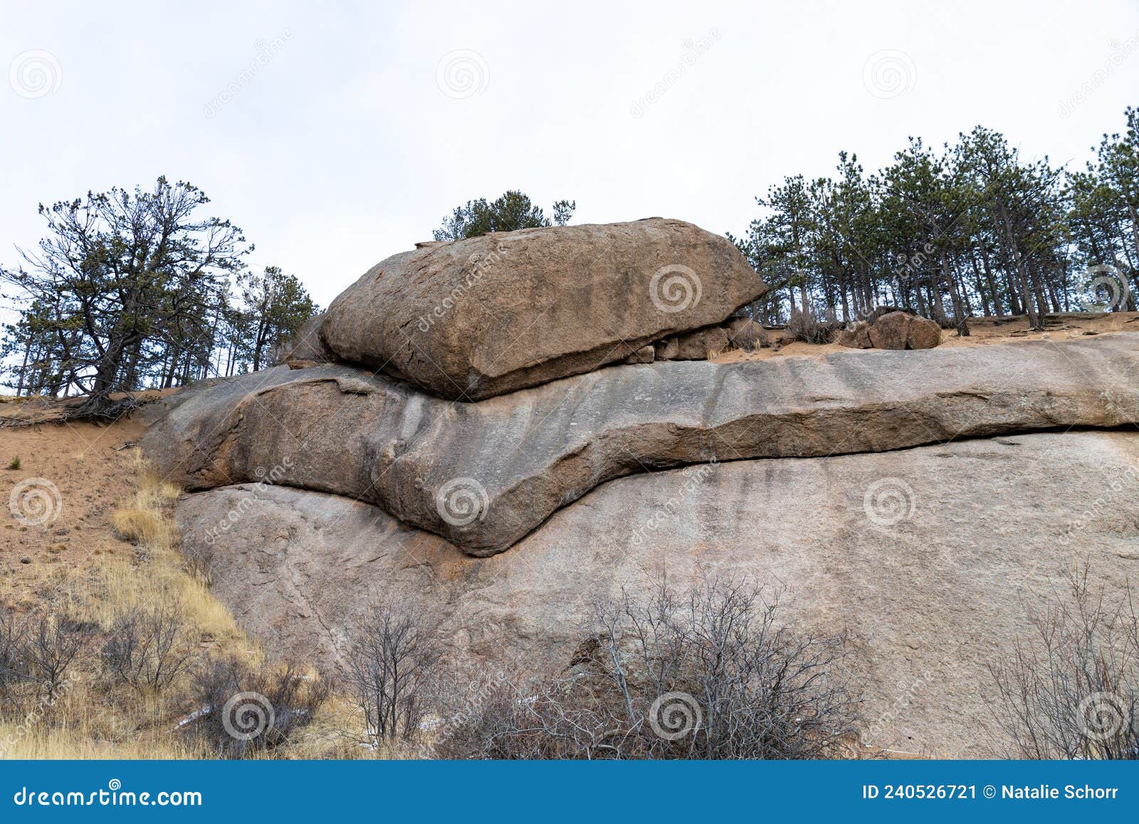 Large Smooth Stone Surface with a Balanced Boulder on a Mountain Face ...