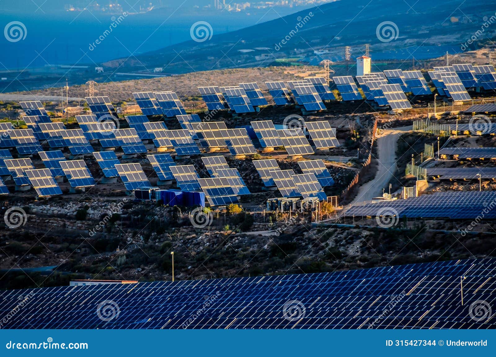 A Large Solar Farm with Many Solar Panels Stock Photo - Image of home ...