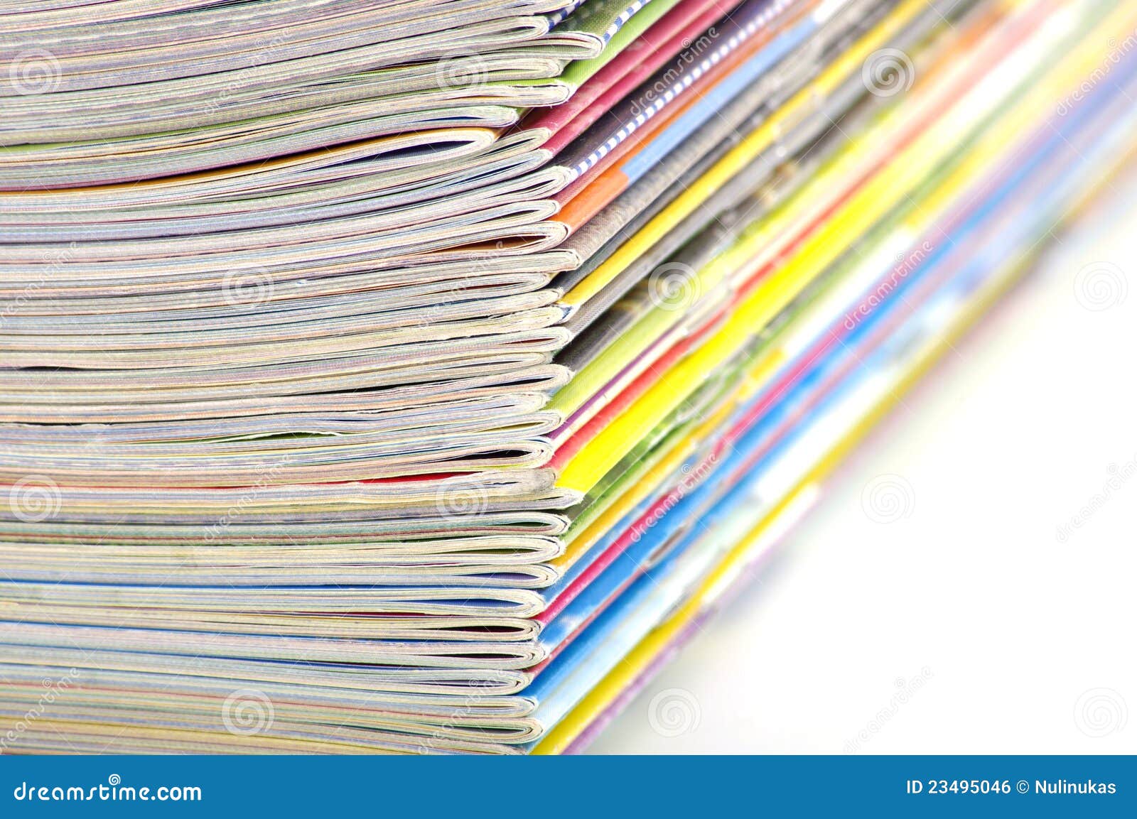 A large stack of magazines stock photo. Image of periodical - 23495046