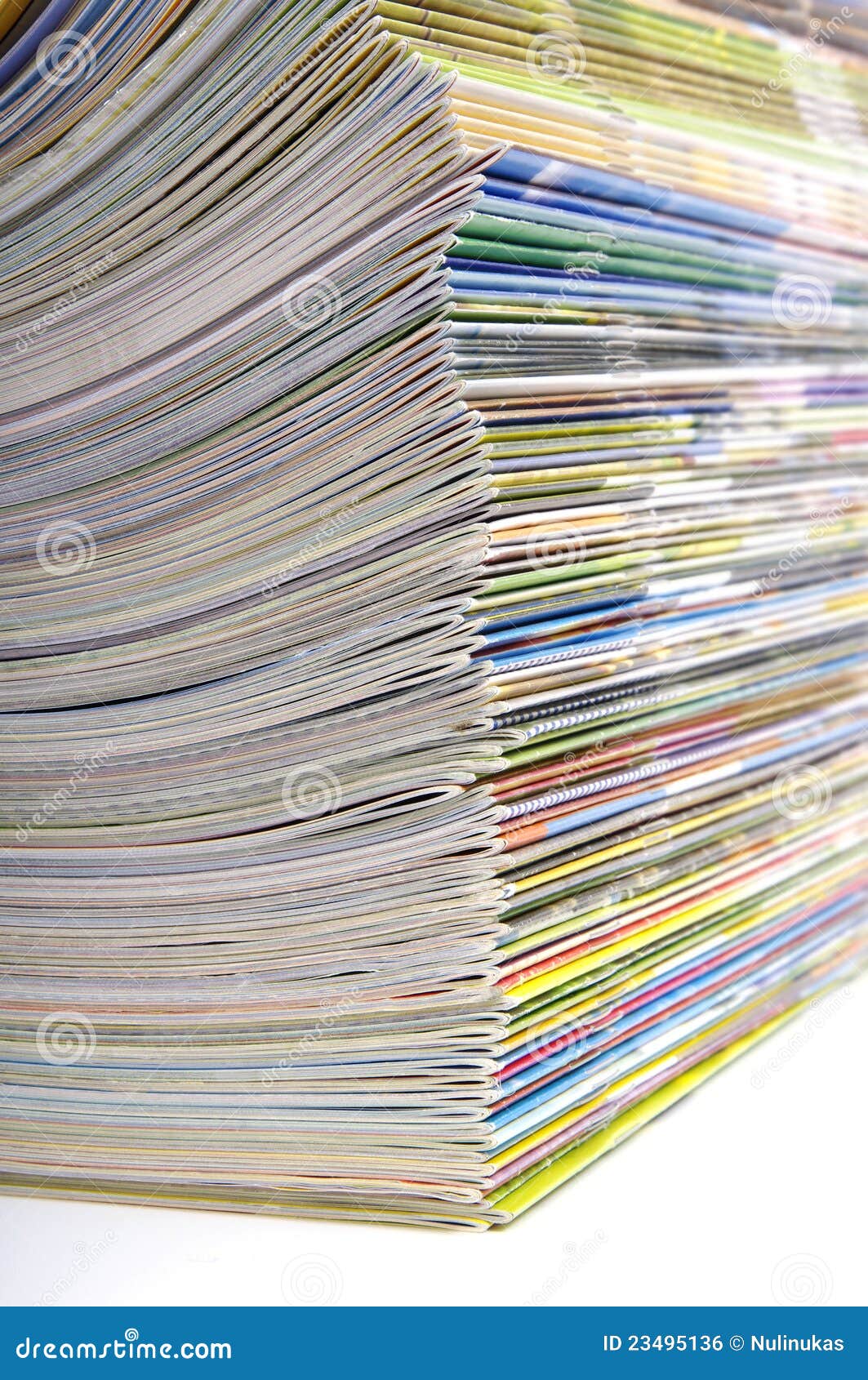 A large stack of magazines stock photo. Image of pile - 23495136