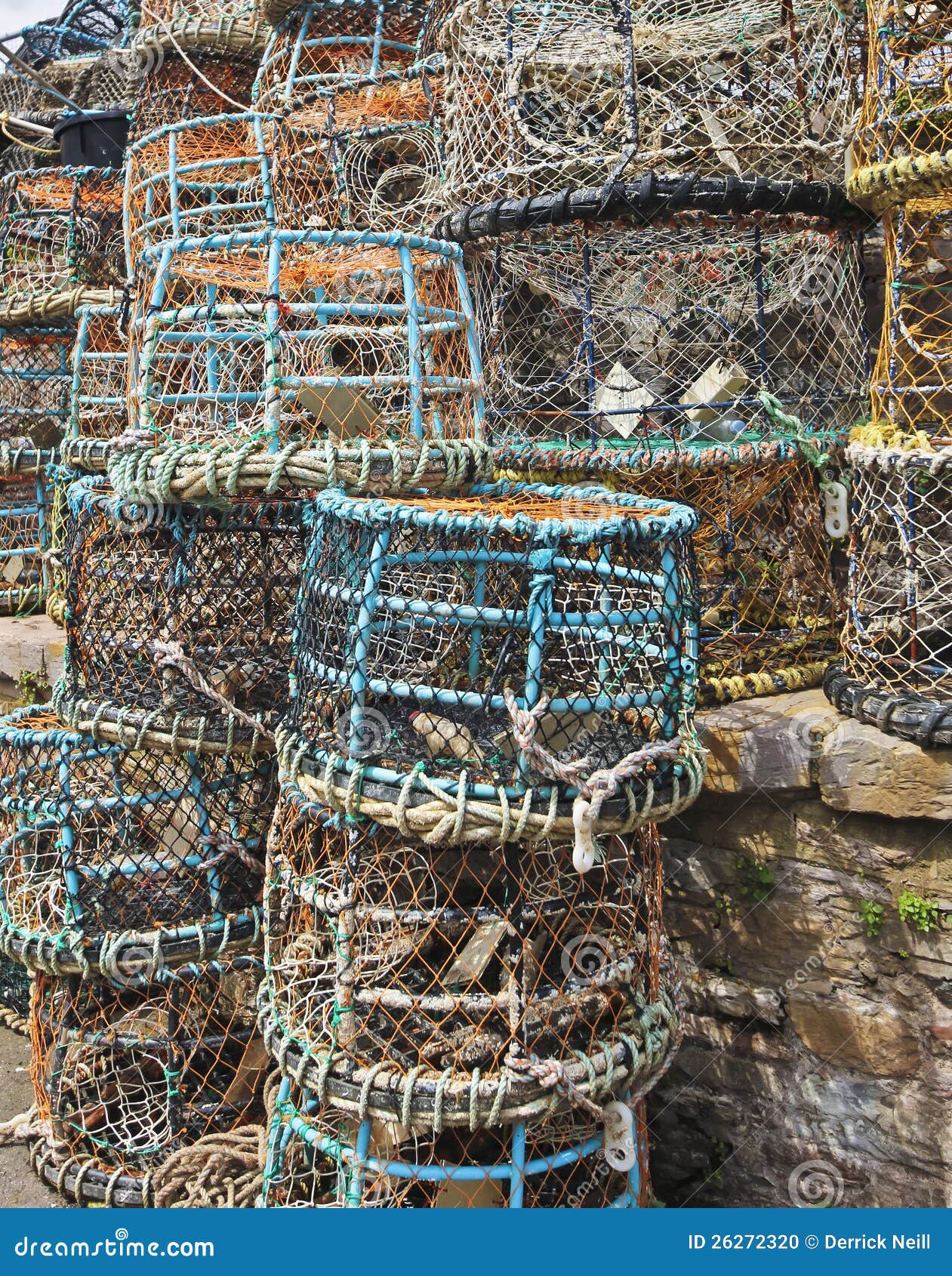A Large Stack of Multicolored Crab Pots Stock Photo - Image of cord ...