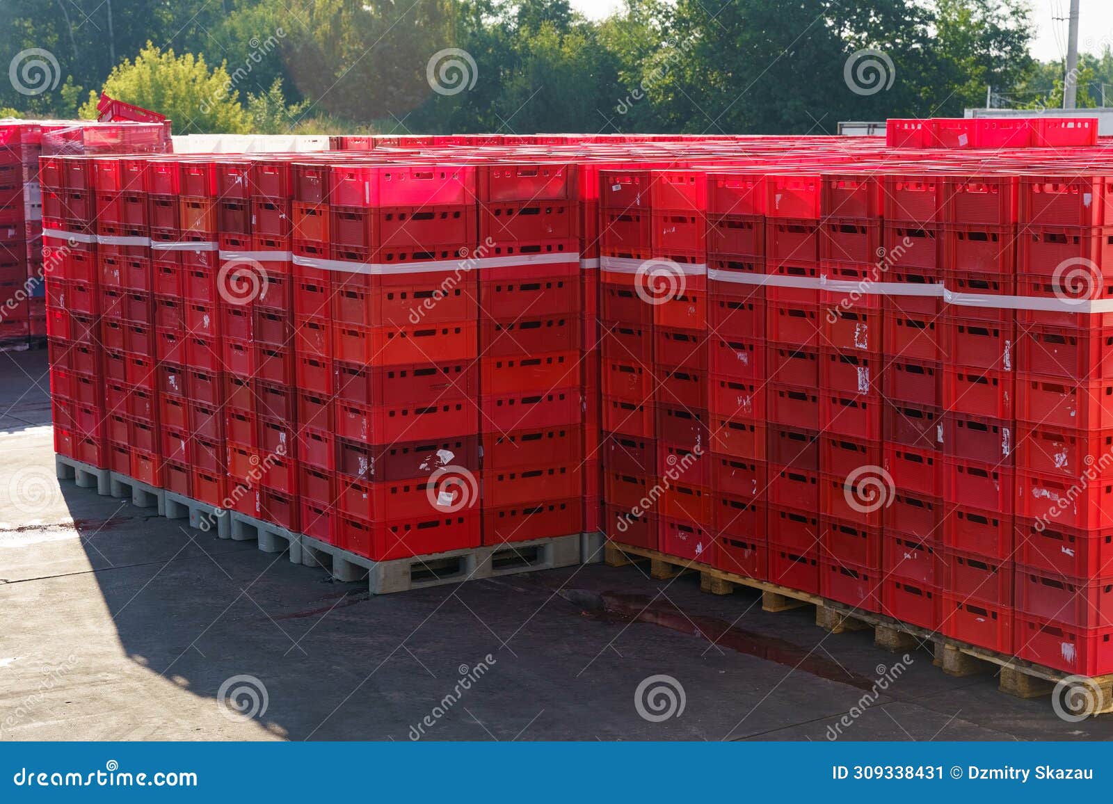 Large Stack of Red Plastic Boxes in the Parking Lot Stock Image - Image ...
