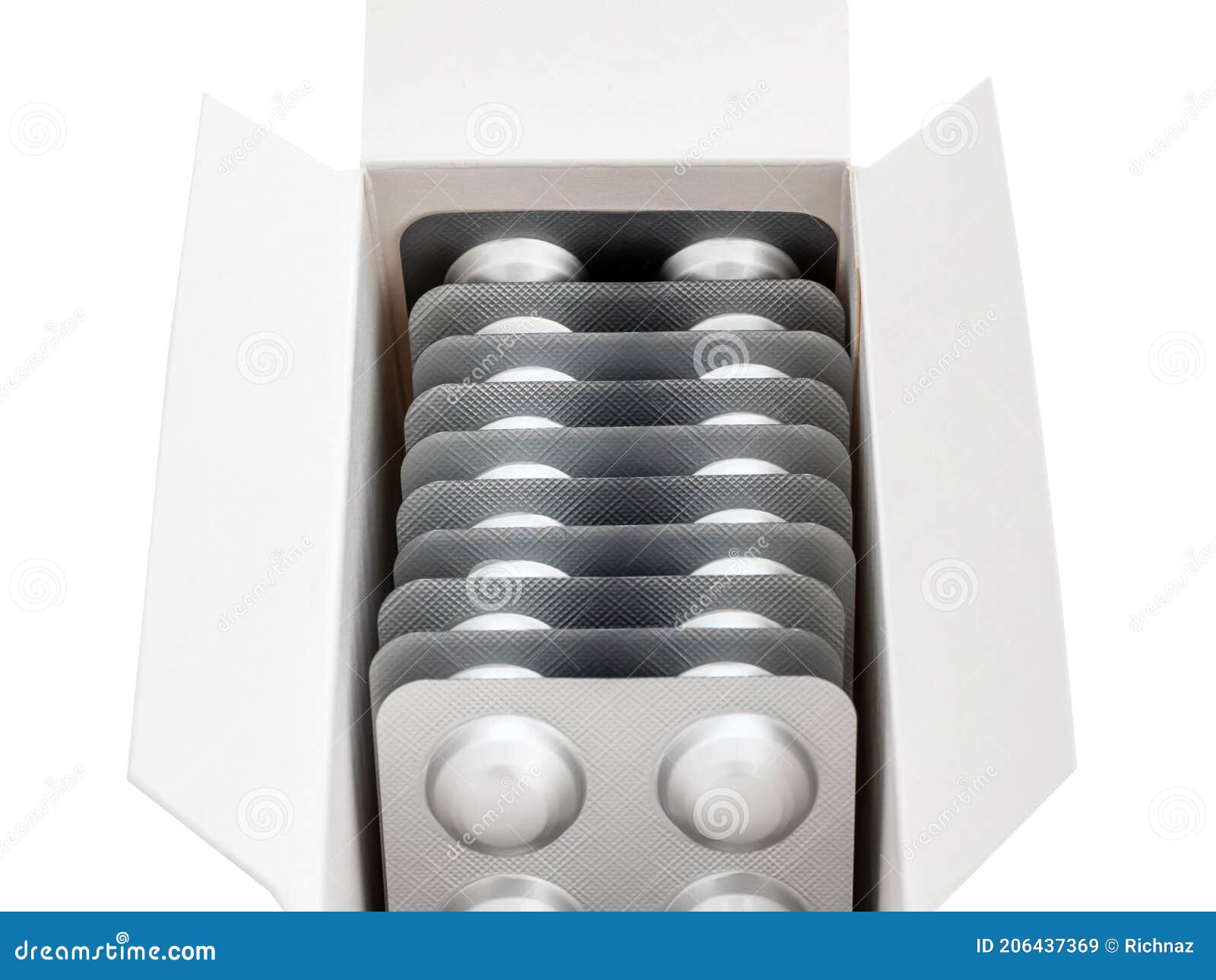 A Large Stack of Tablets in a Silver Package on a White Background ...