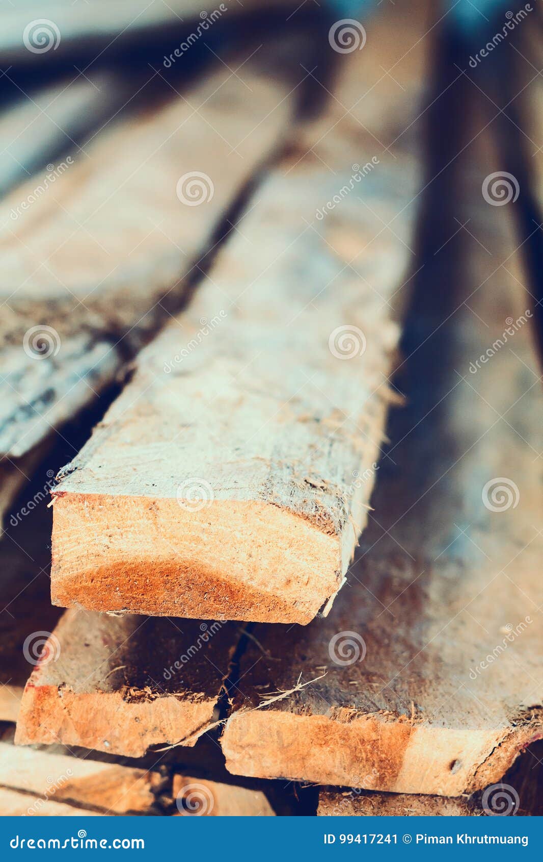 Large stack of wood planks stock image. Image of lumber - 99417241