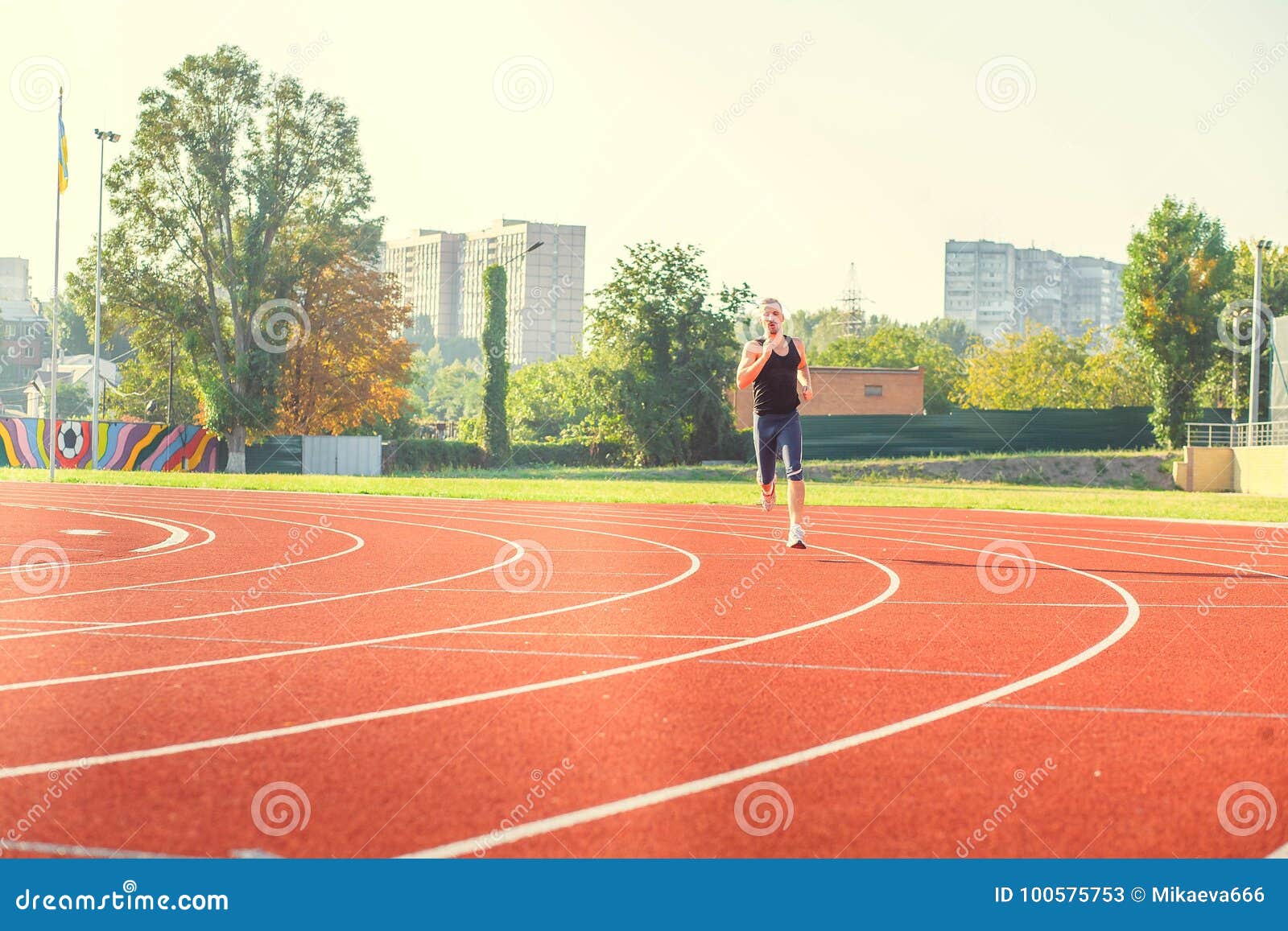 A Large Stadium on Which Runs a Man Stock Image - Image of motion ...