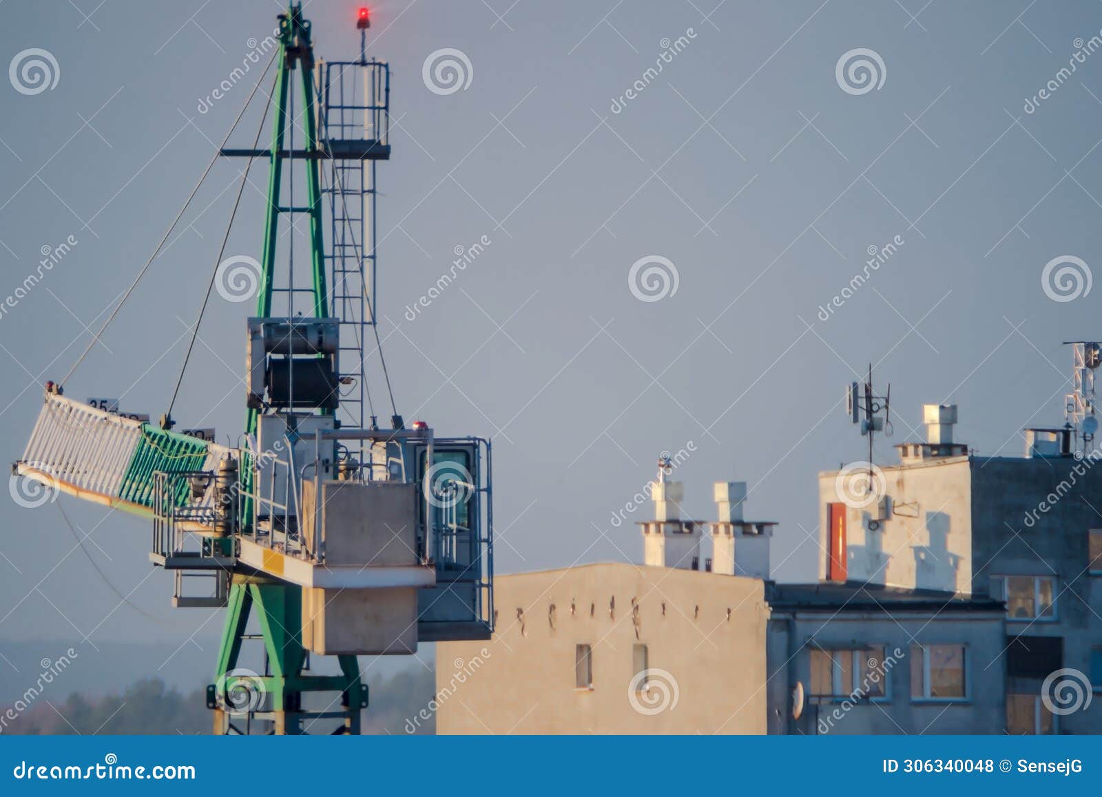 A Large Steel Crane with an Openwork Structure on a Construction Site ...