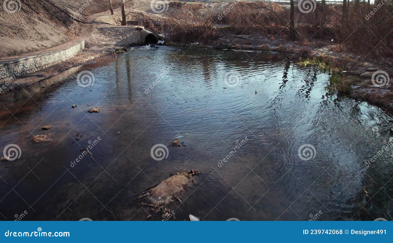 A Large Steel Pipe from Which Water Flows into a Stream. Stock Footage ...