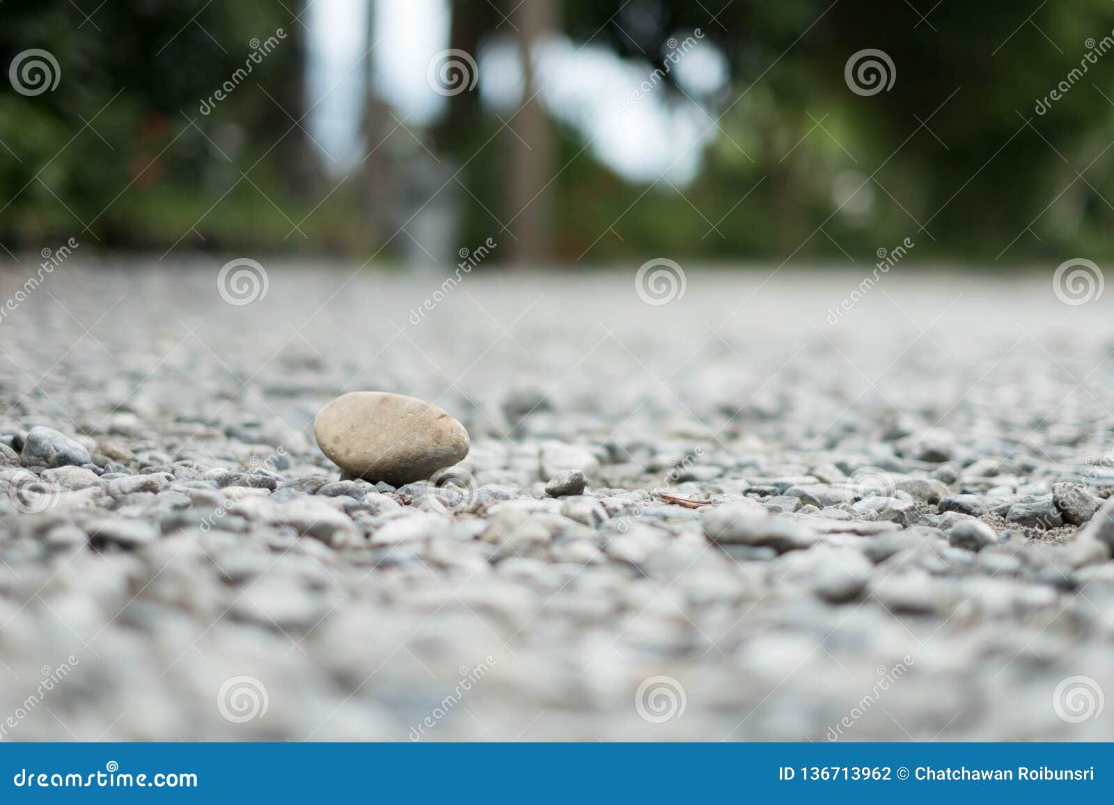 A Large Stone Placed on a Small Rock in Nature Stock Photo - Image of ...