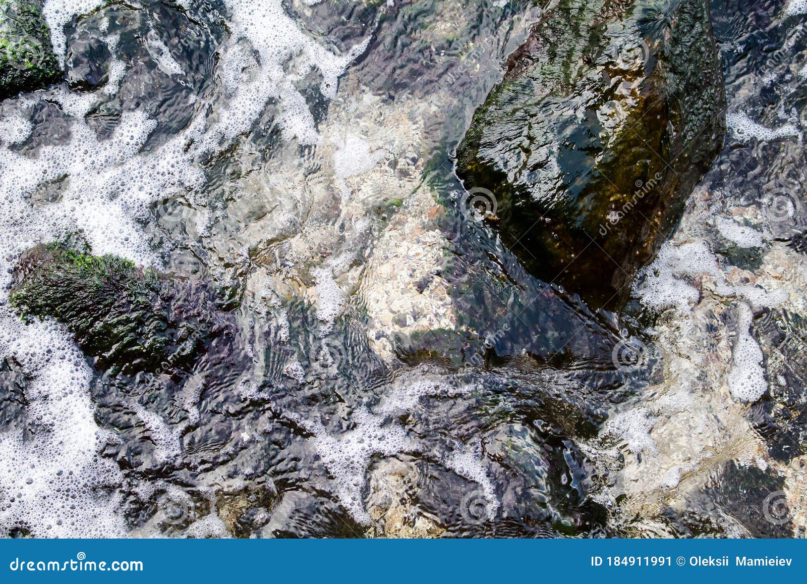 Large Stones with Algae on Them, Washed by Sea or Ocean Waves, Forming ...