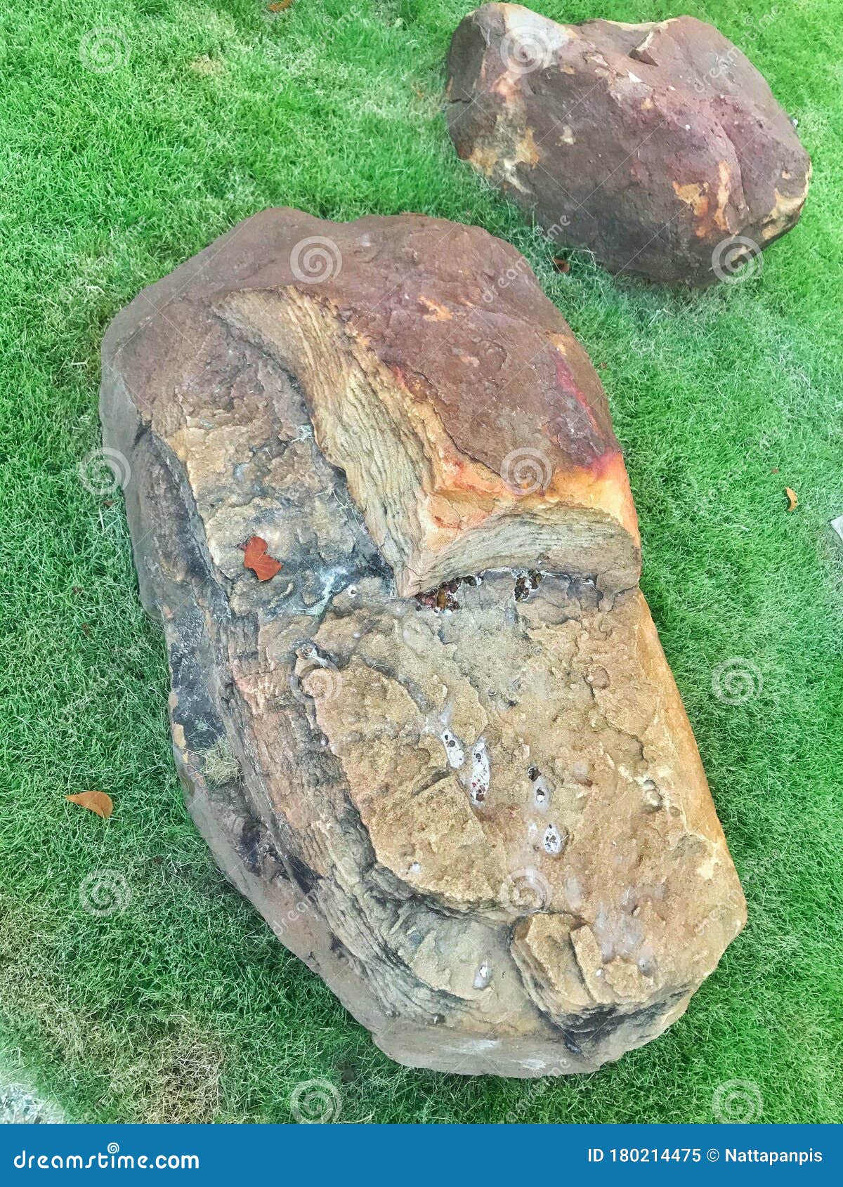 Large Stones are on the Grass in the Garden Stock Image - Image of ...