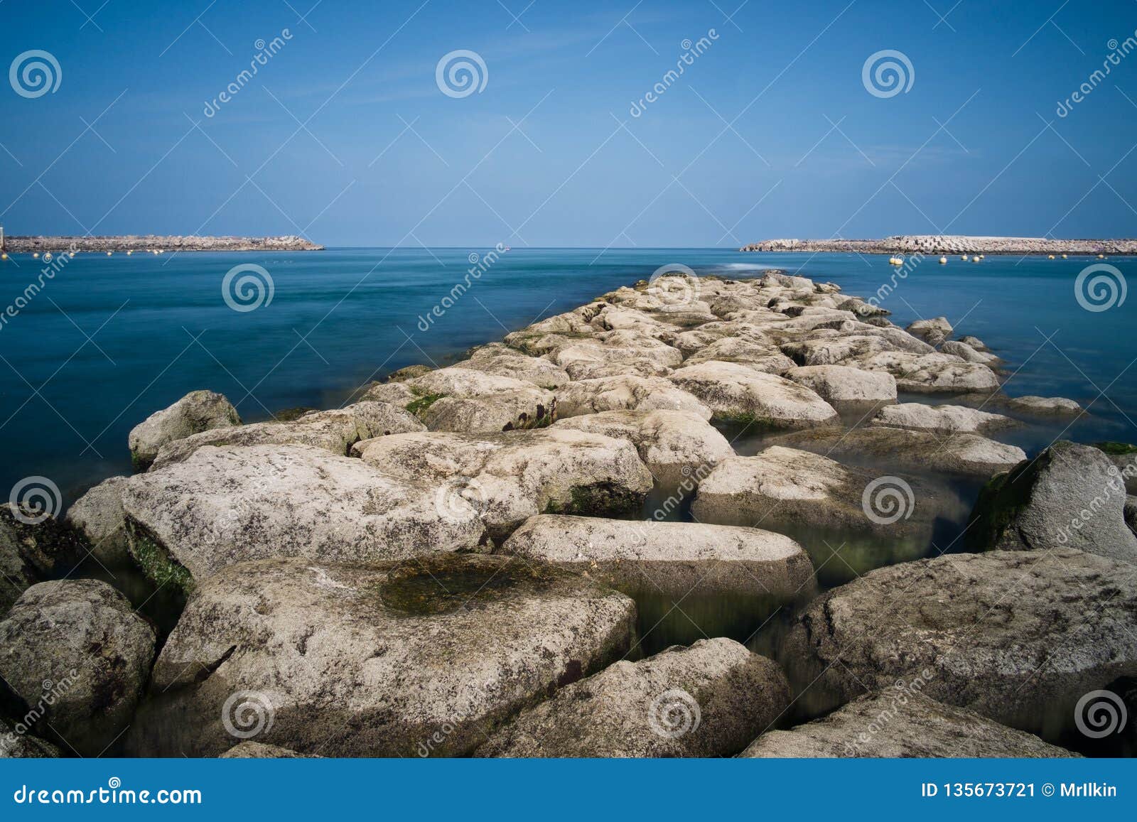 Large stones at ocean bay stock image. Image of asian - 135673721