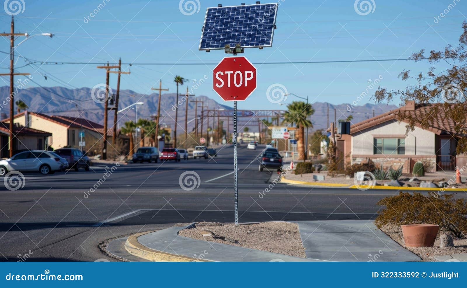 A Large STOP Sign at a Busy Intersection Powered by a Solar Panel on ...